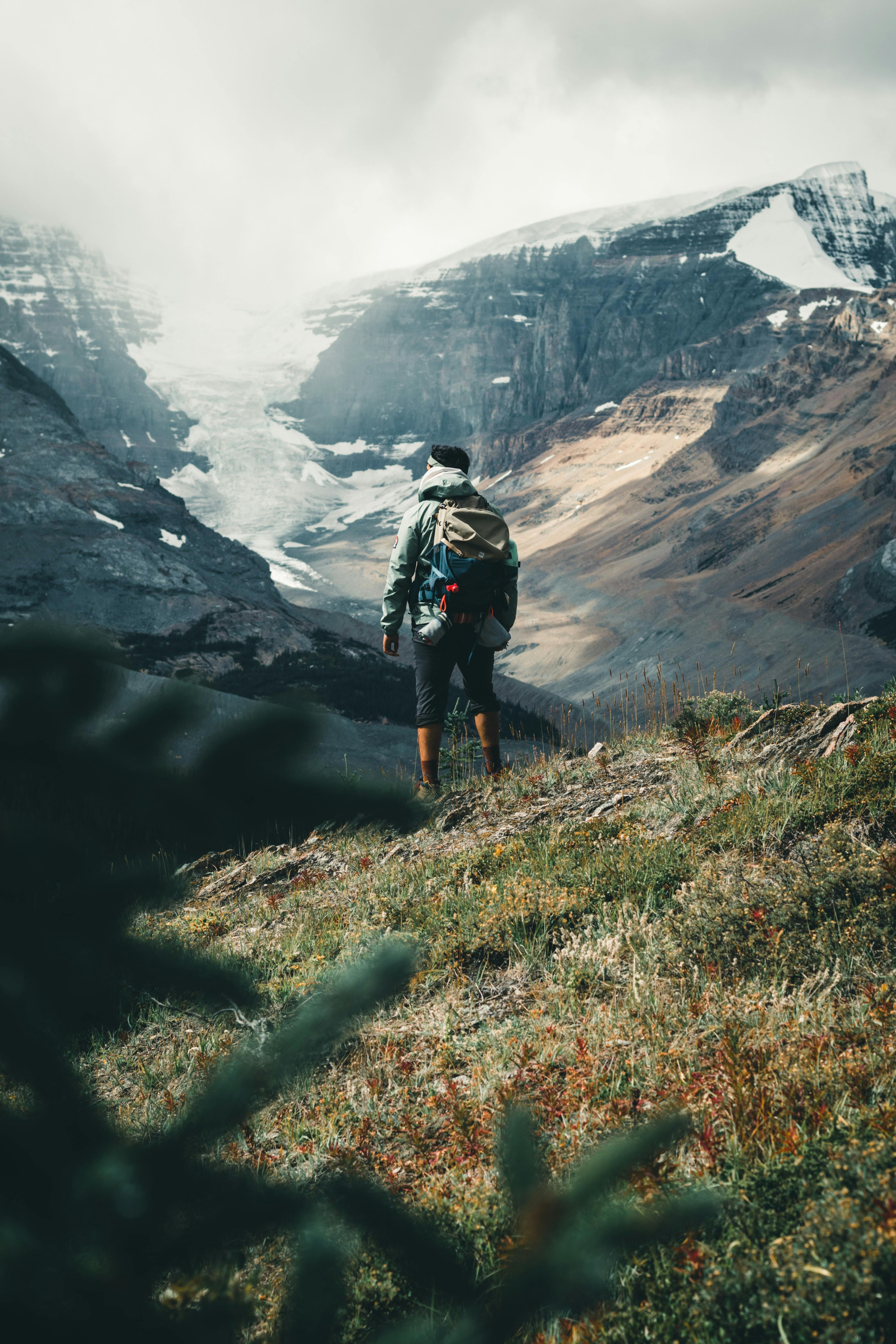 Back View of Man Wearing Backpack · Free Stock Photo