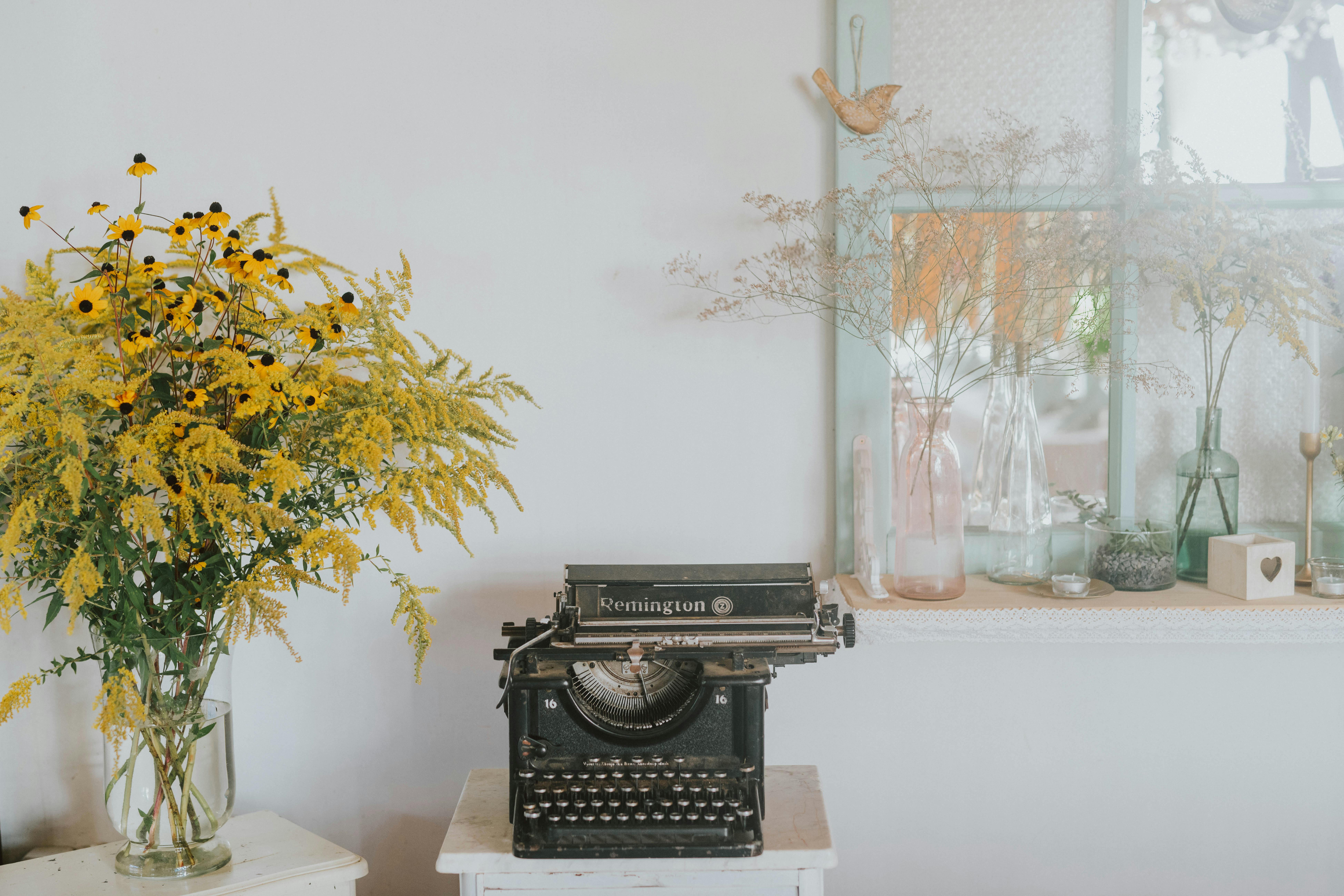Black Typewriter on White Table · Free Stock Photo
