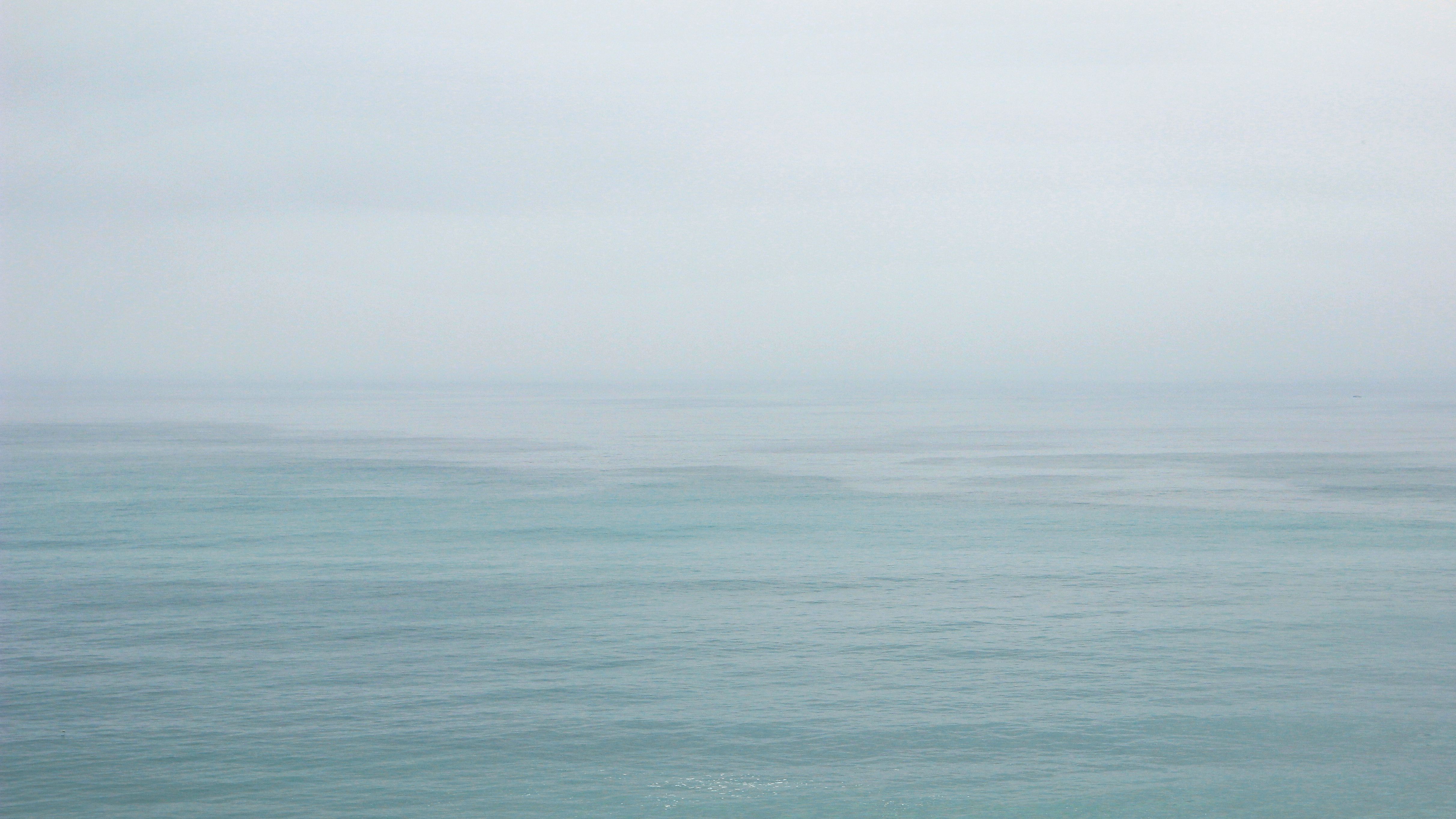 Photo of a Body of Water with Fog · Free Stock Photo