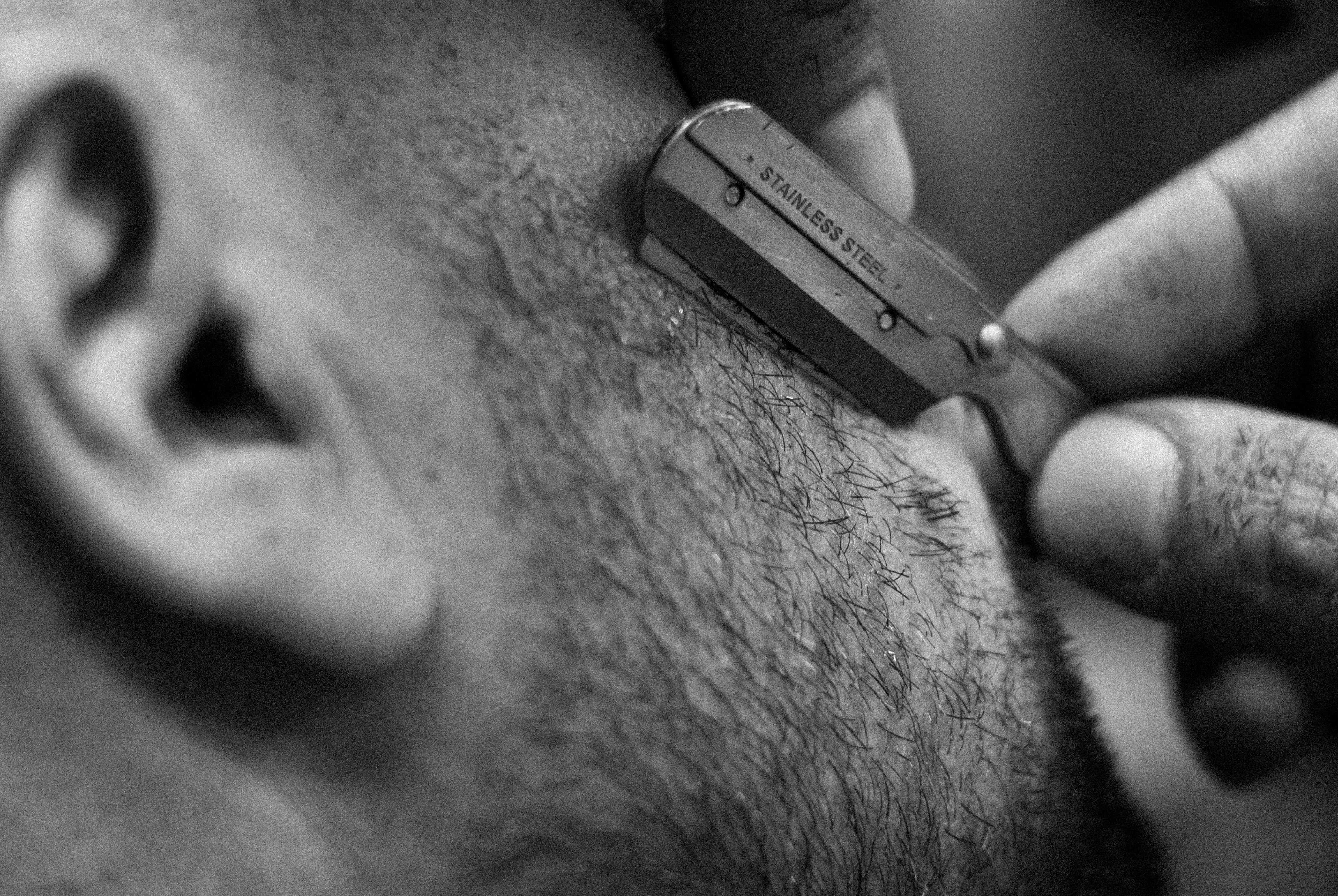 Person Holding Gray Straight Razor · Free Stock Photo
