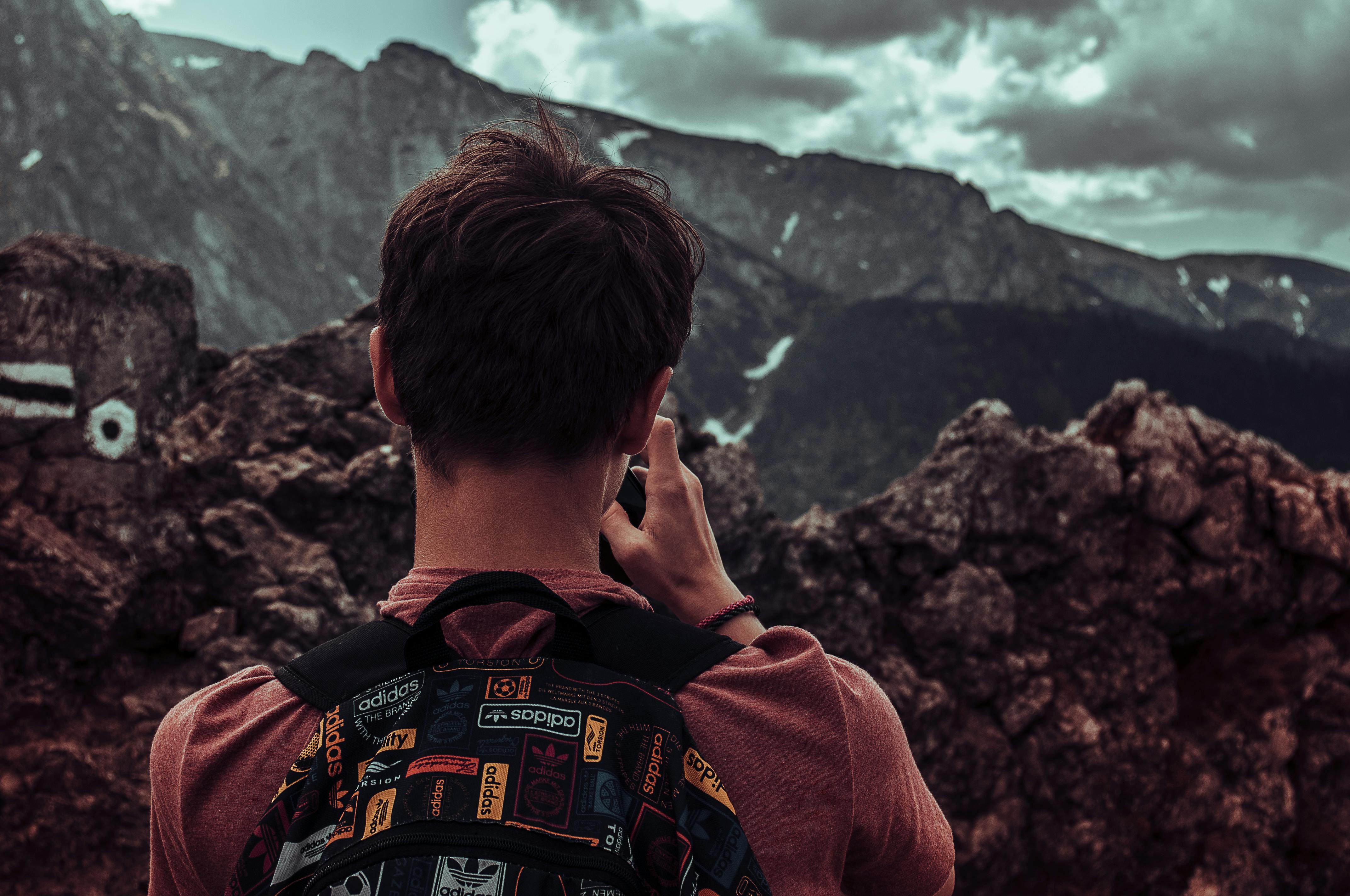 Man Taking Photos Of Mountains · Free Stock Photo