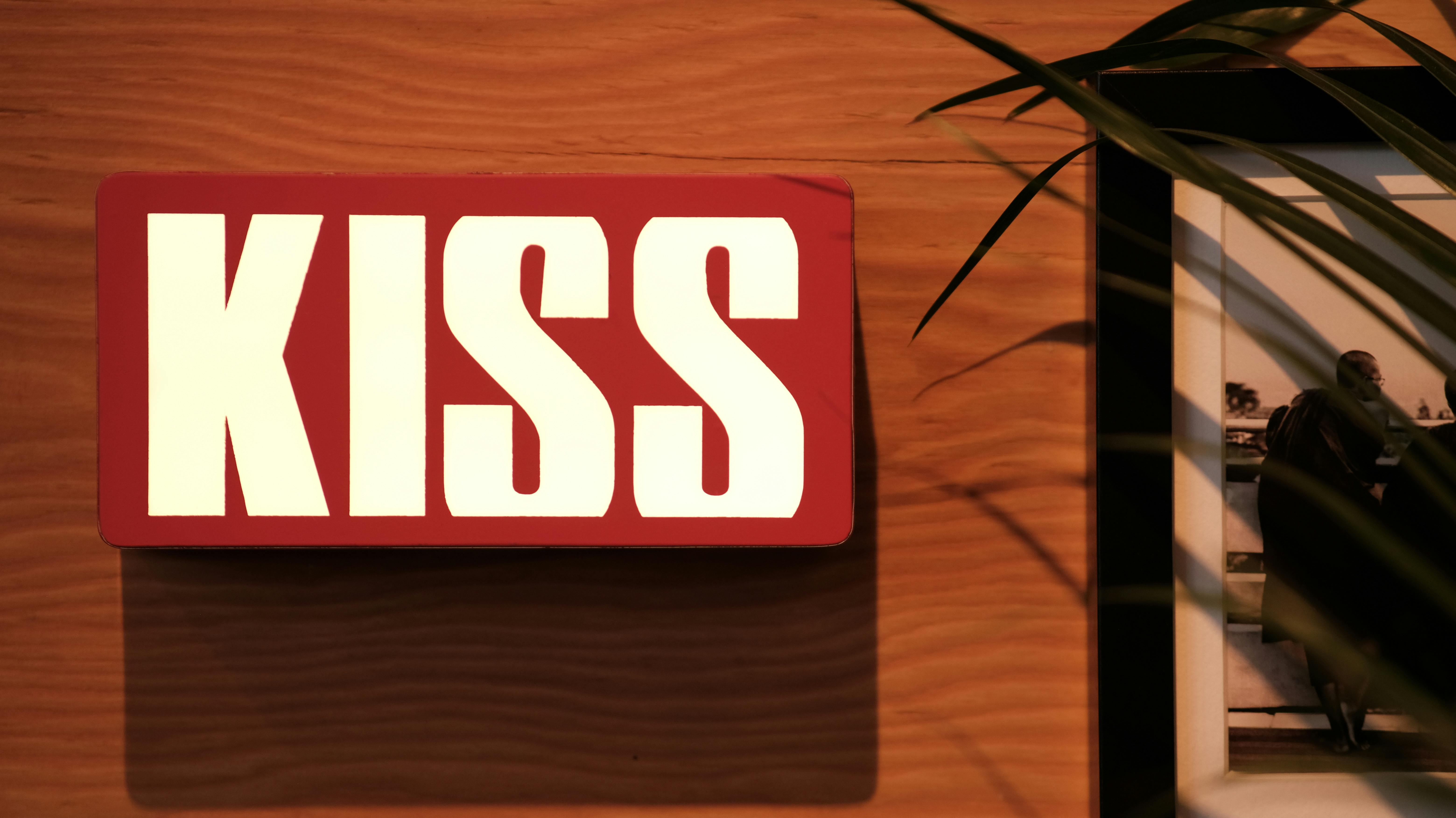 Kiss Signage on Wooden Wall · Free Stock Photo