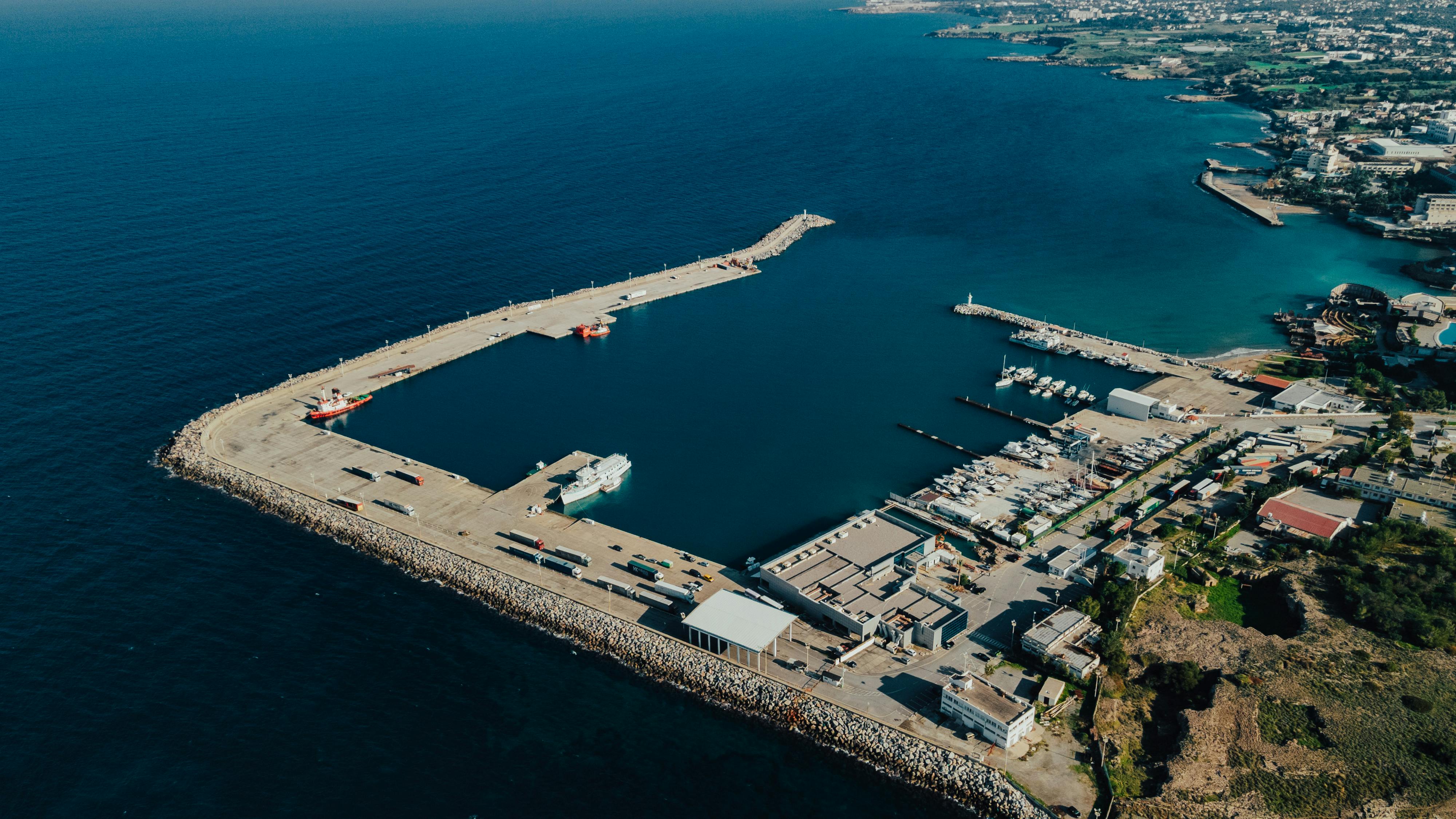 Aerial View of Brown Dock near Body of Water · Free Stock Photo