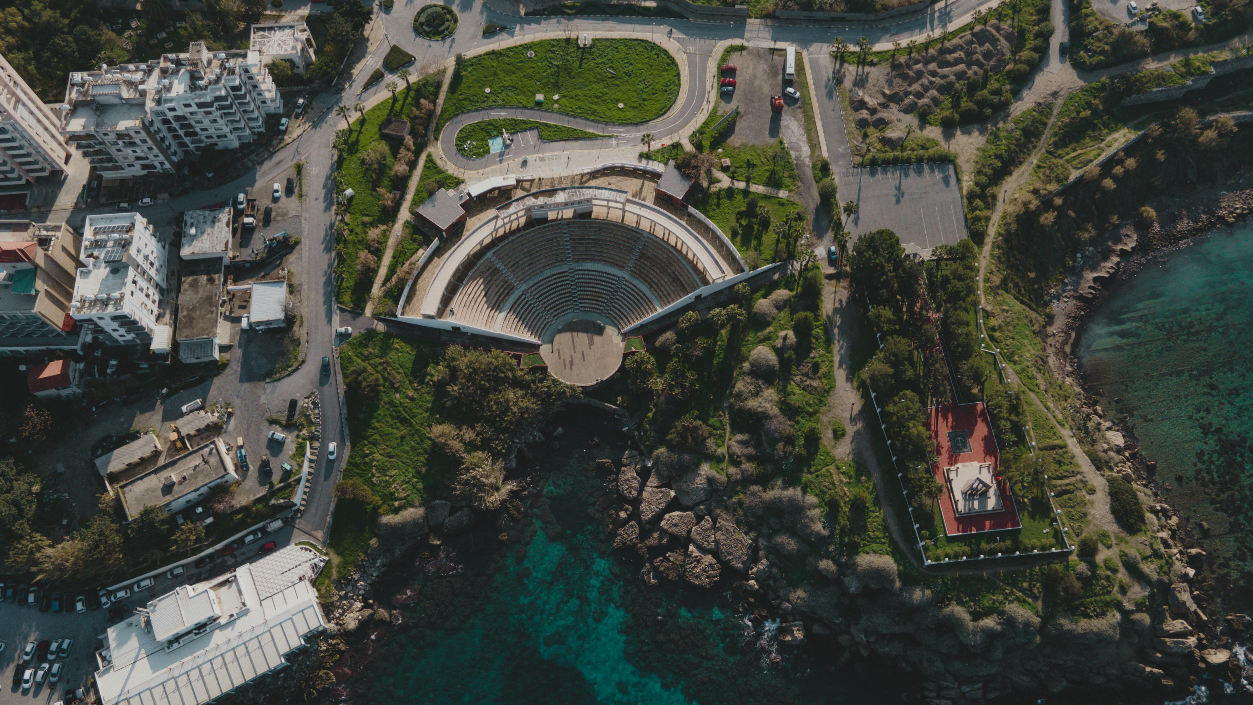Aerial Photography of City and an Amphitheatre · Free Stock Photo