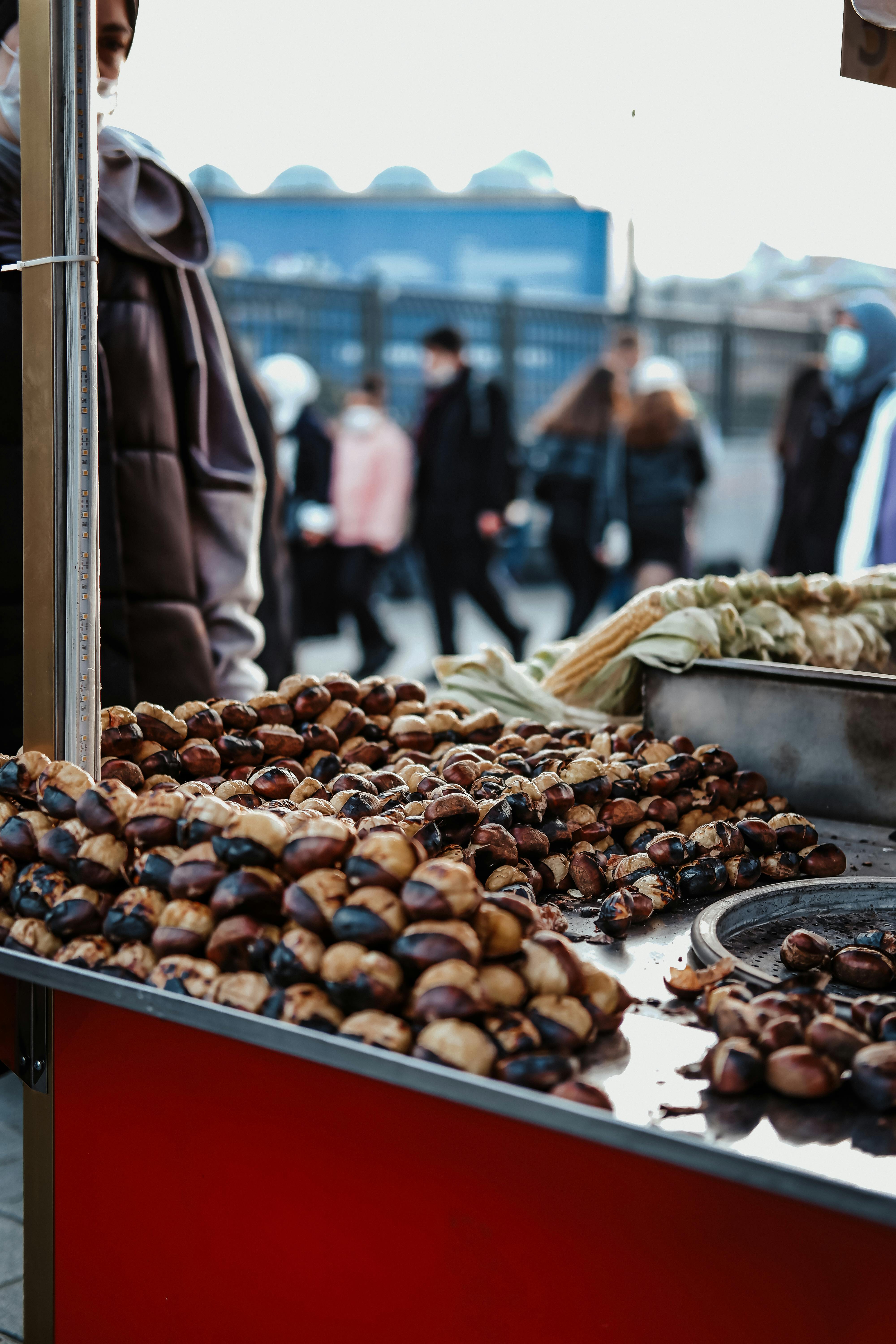 Person Selling Chestnuts · Free Stock Photo
