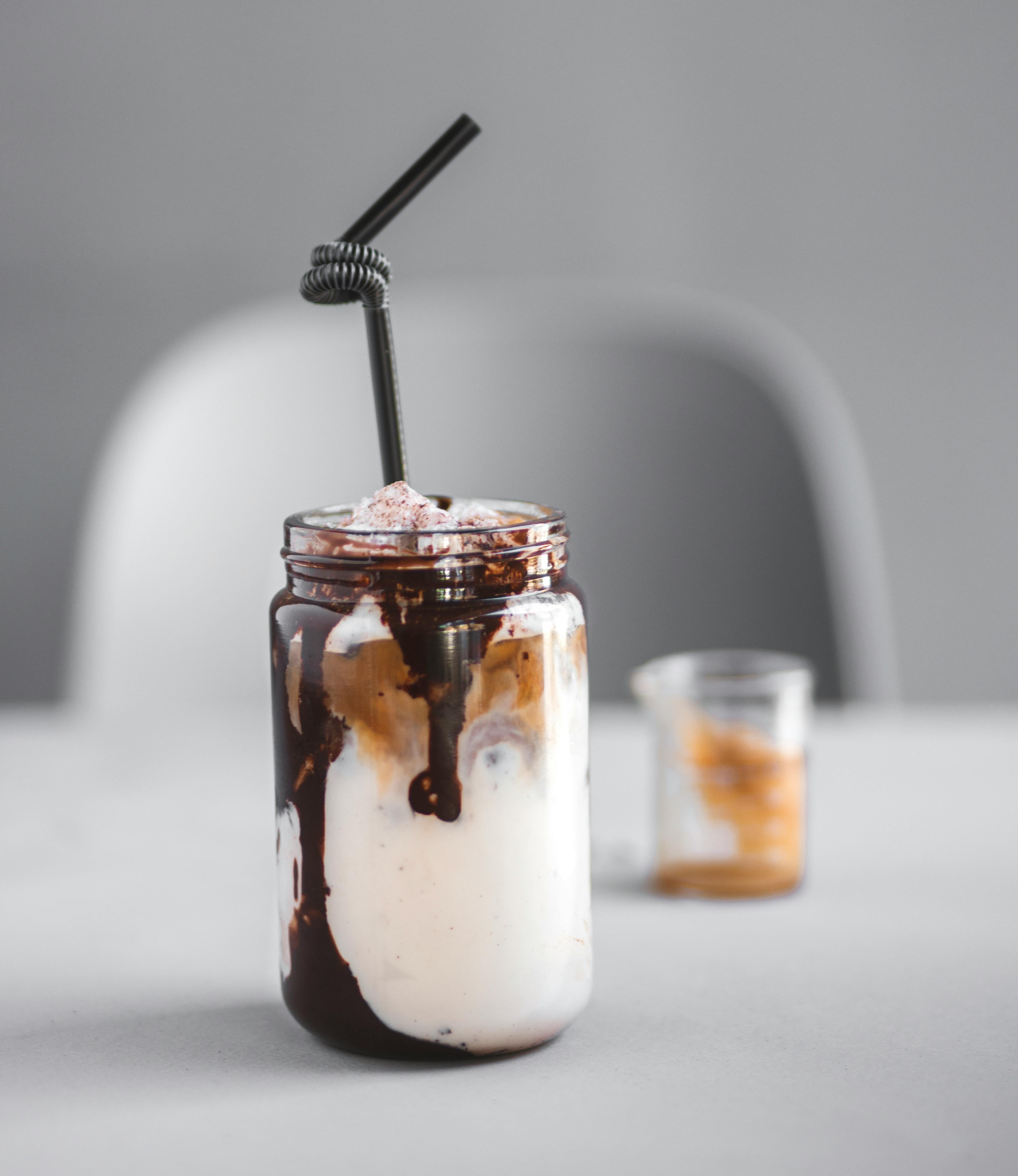 White and Brown Liquid on Clear Glass Jar · Free Stock Photo