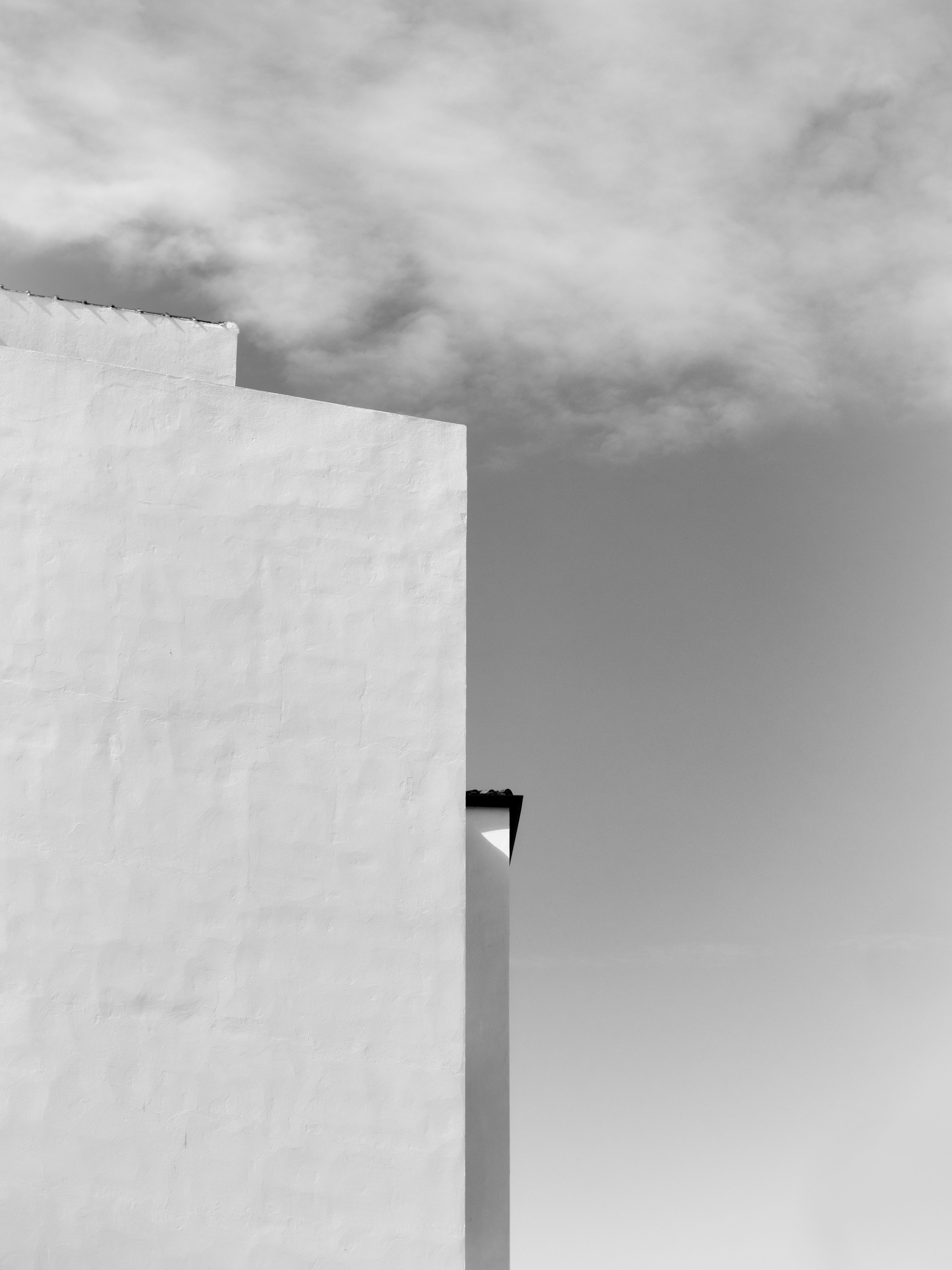 Grayscale Photo of Concrete Wall · Free Stock Photo