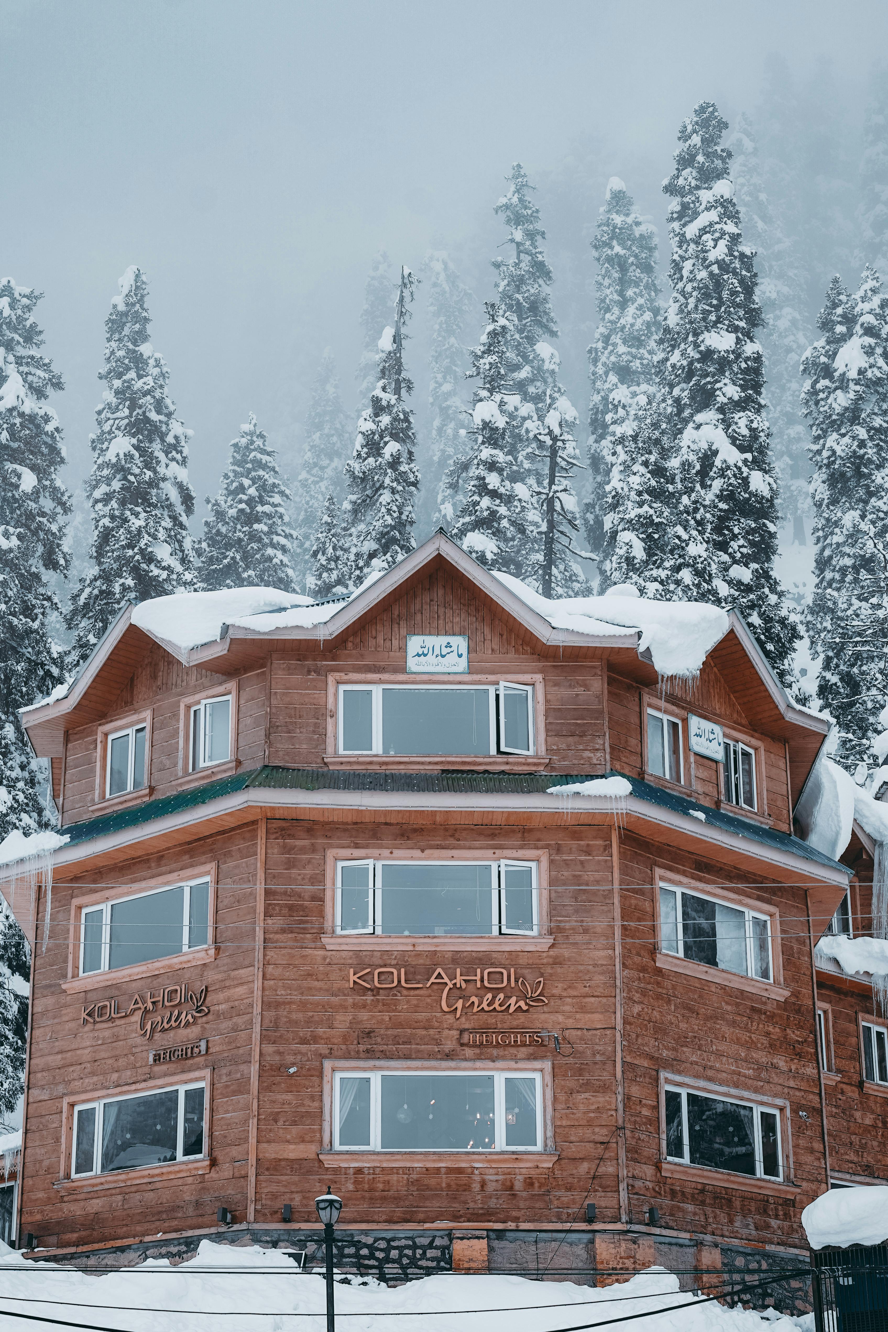 Hotel in Snow in Winter Mountains · Free Stock Photo