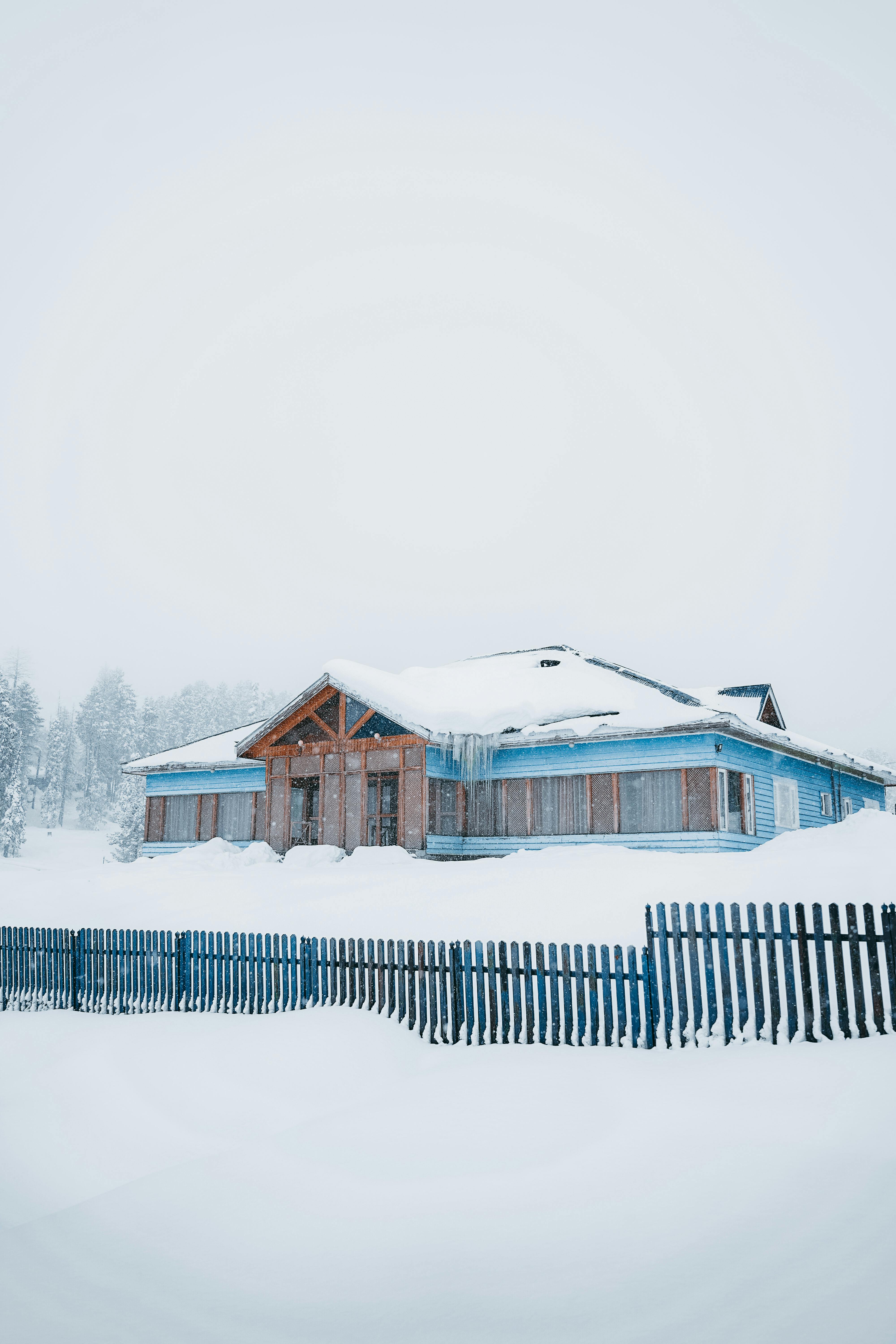 Brown Wooden House Covered With Snow on a Snow Covered Landscape · Free ...