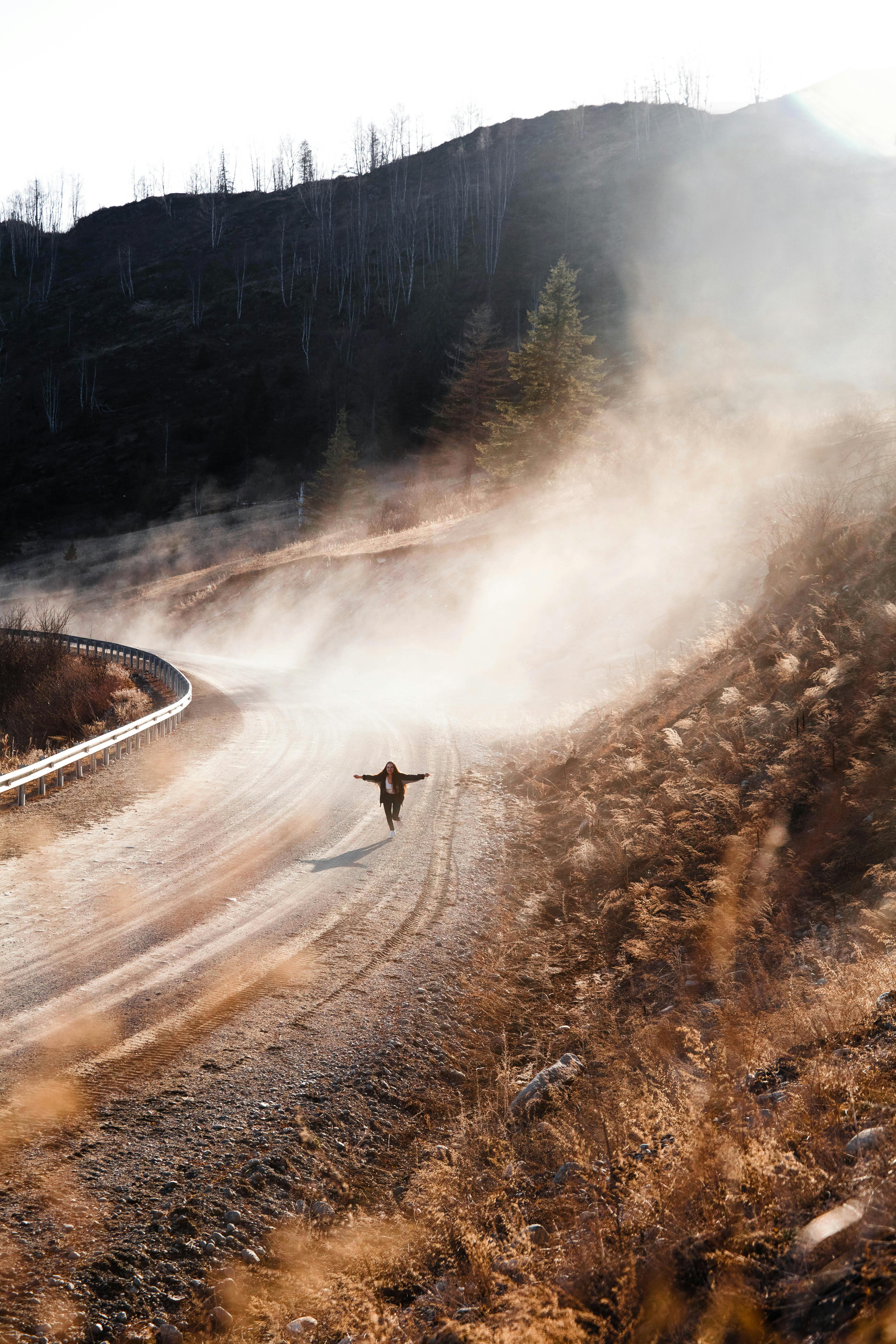 A Person Walking on Road · Free Stock Photo