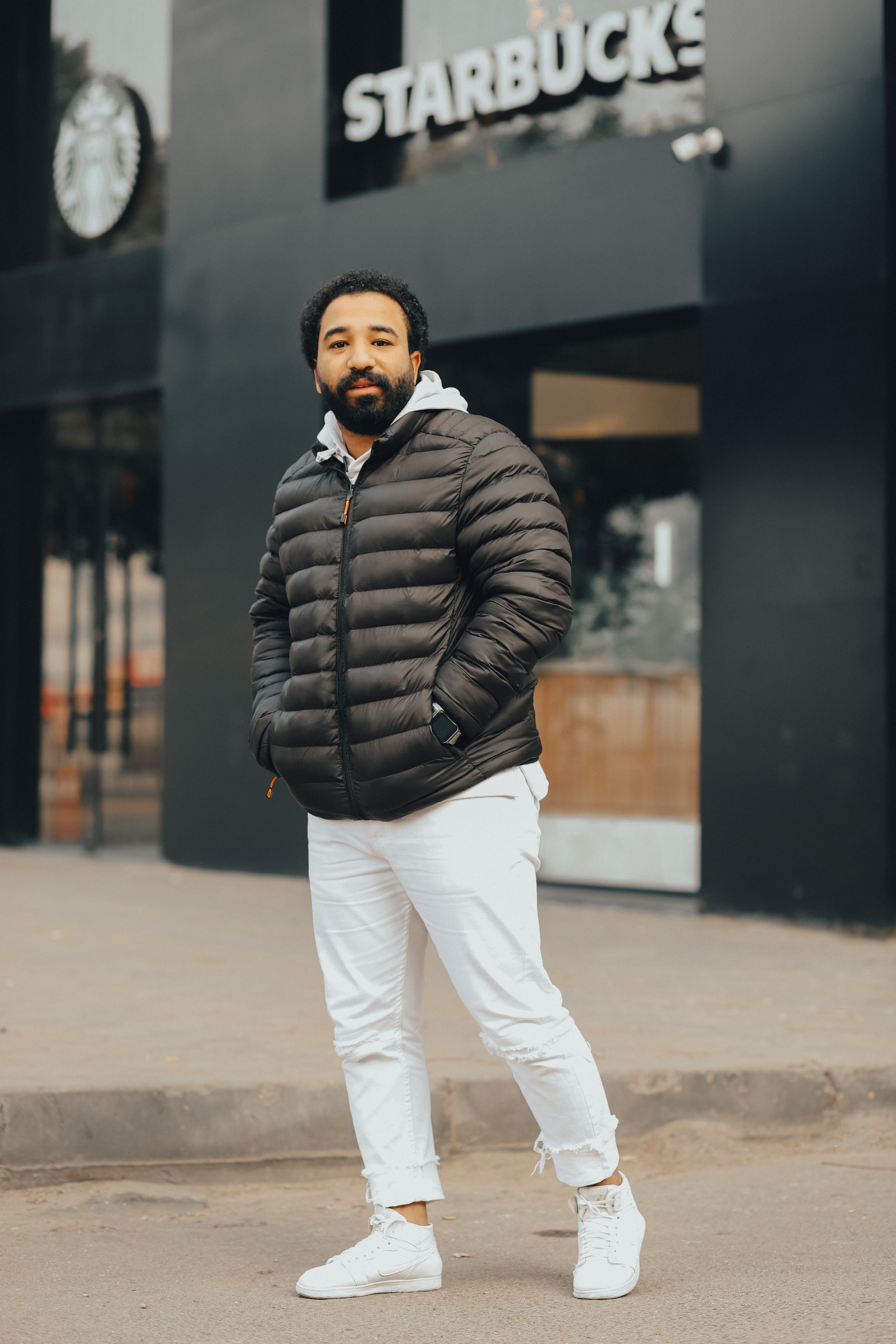 Stylish Man in Black Bubble Jacket · Free Stock Photo