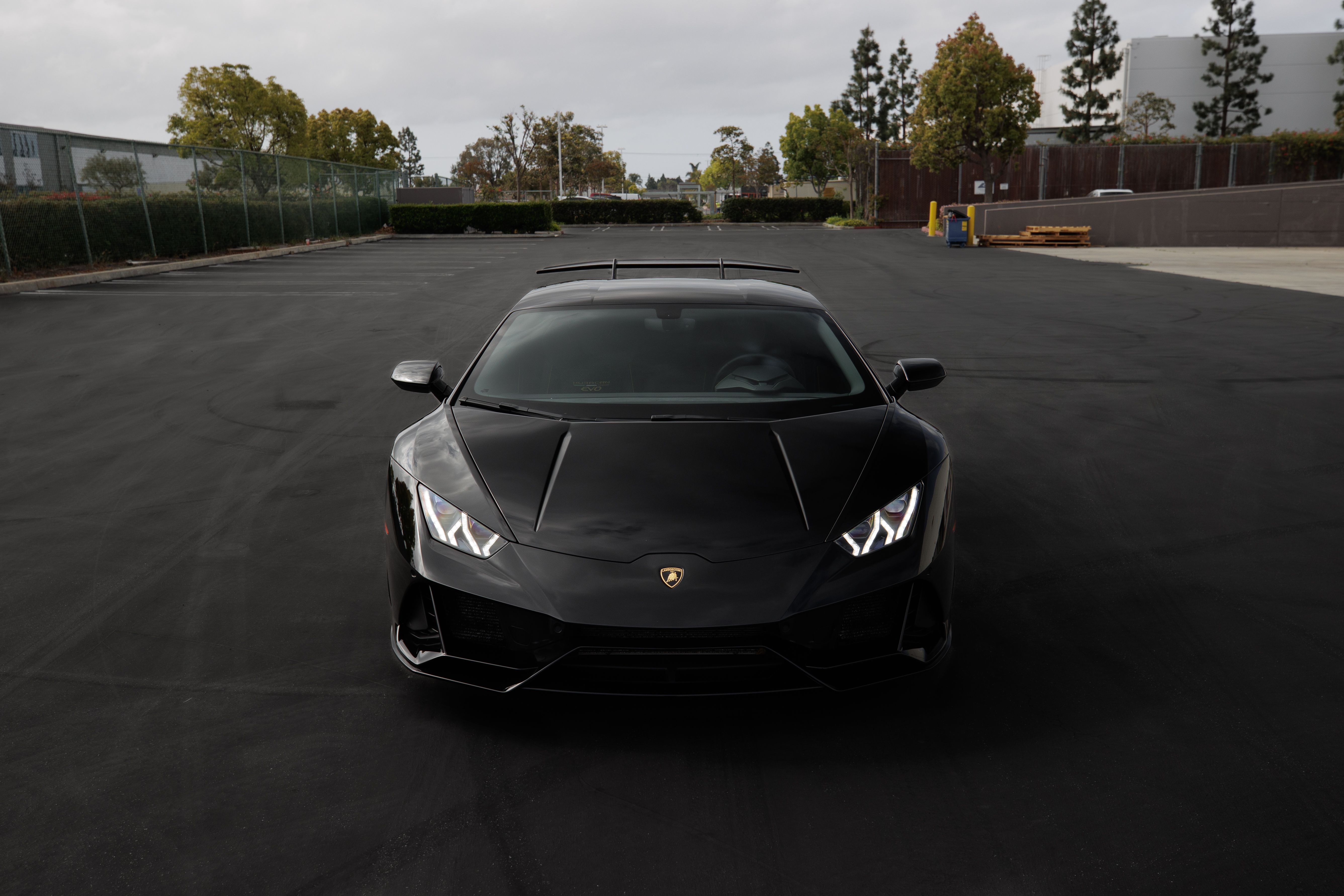 Black Lamborghini Parked on Parking Lot · Free Stock Photo