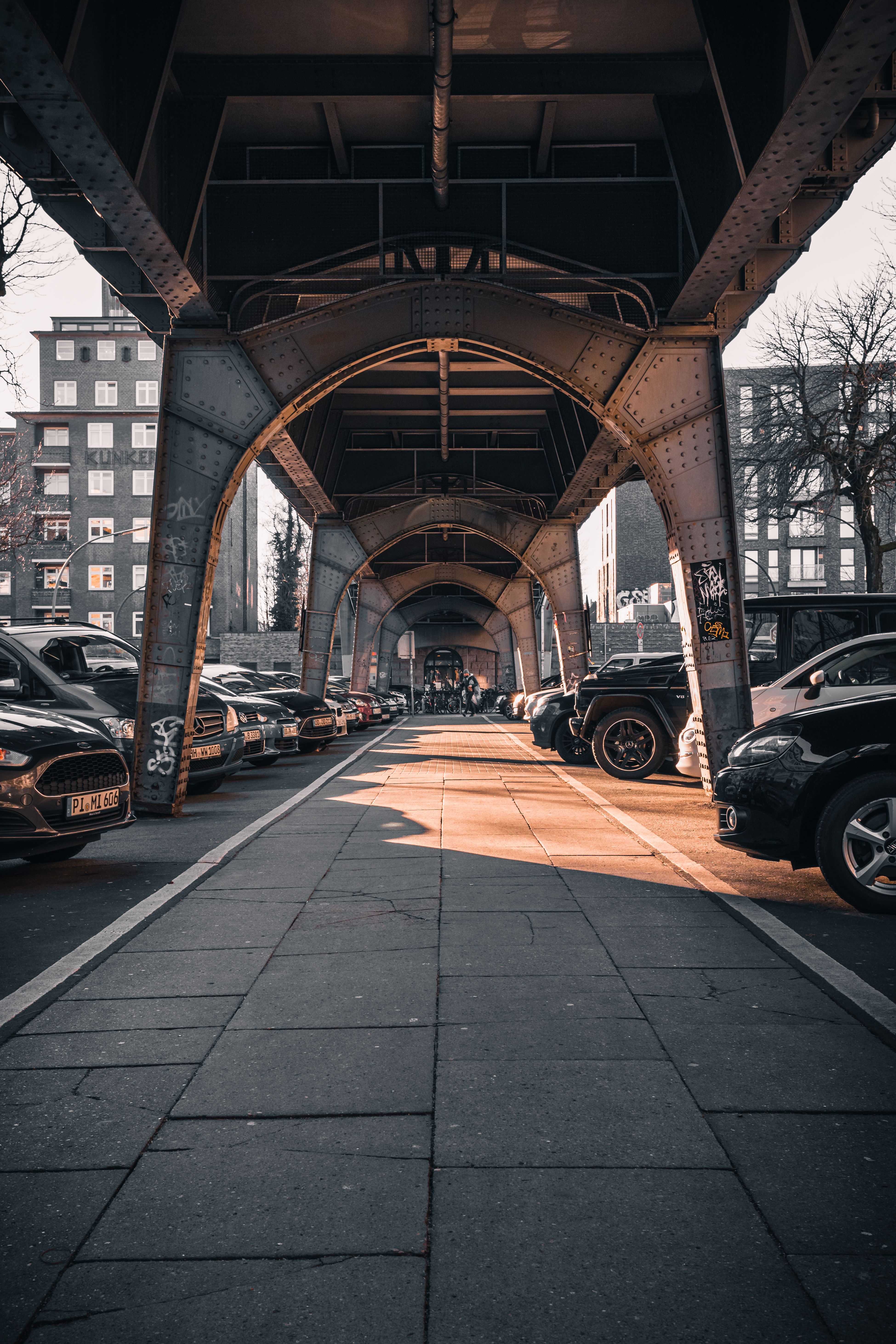 Pavement Under a Bridge in Sunlight · Free Stock Photo