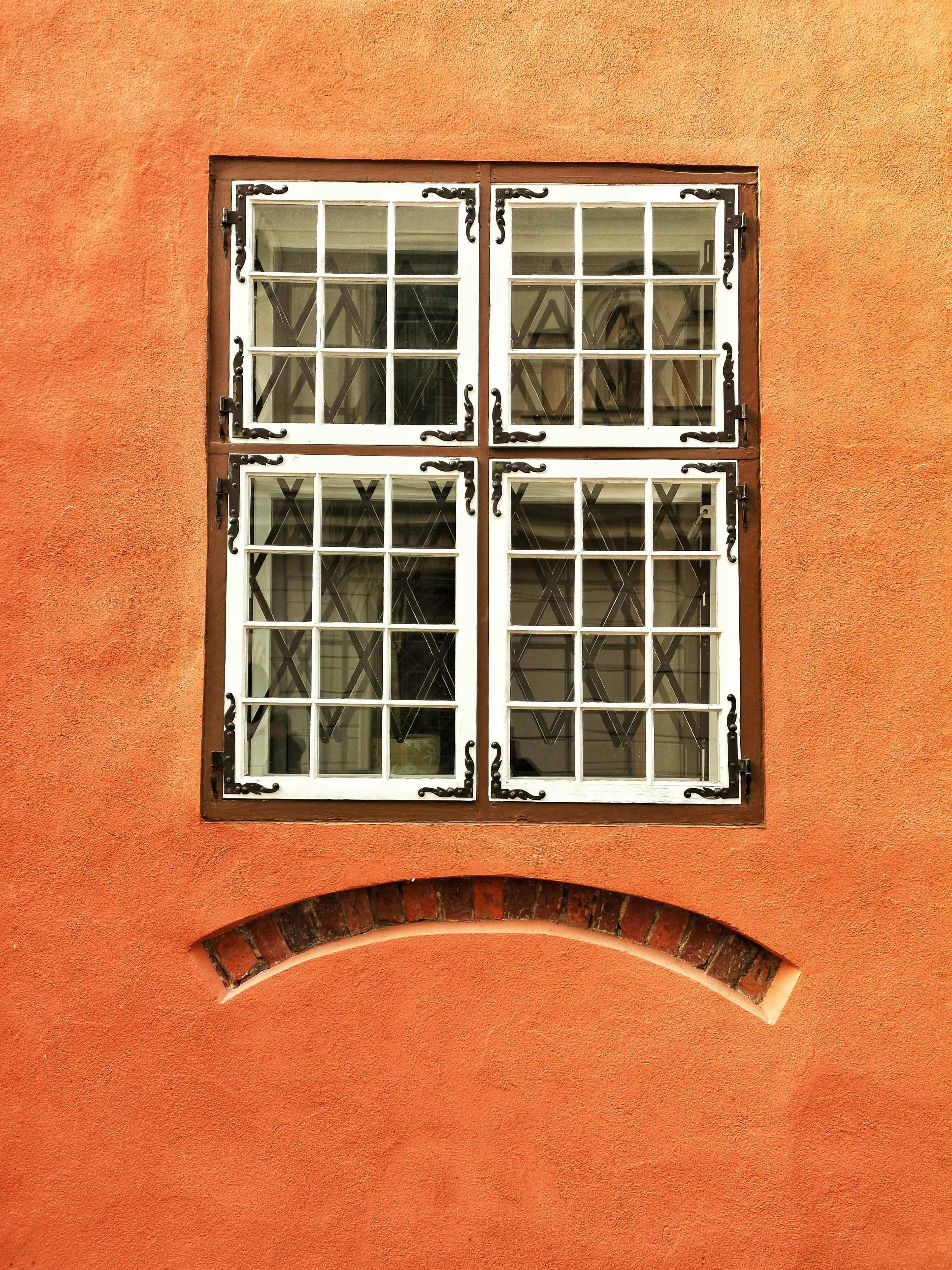 Glass Window on Orange Wall · Free Stock Photo