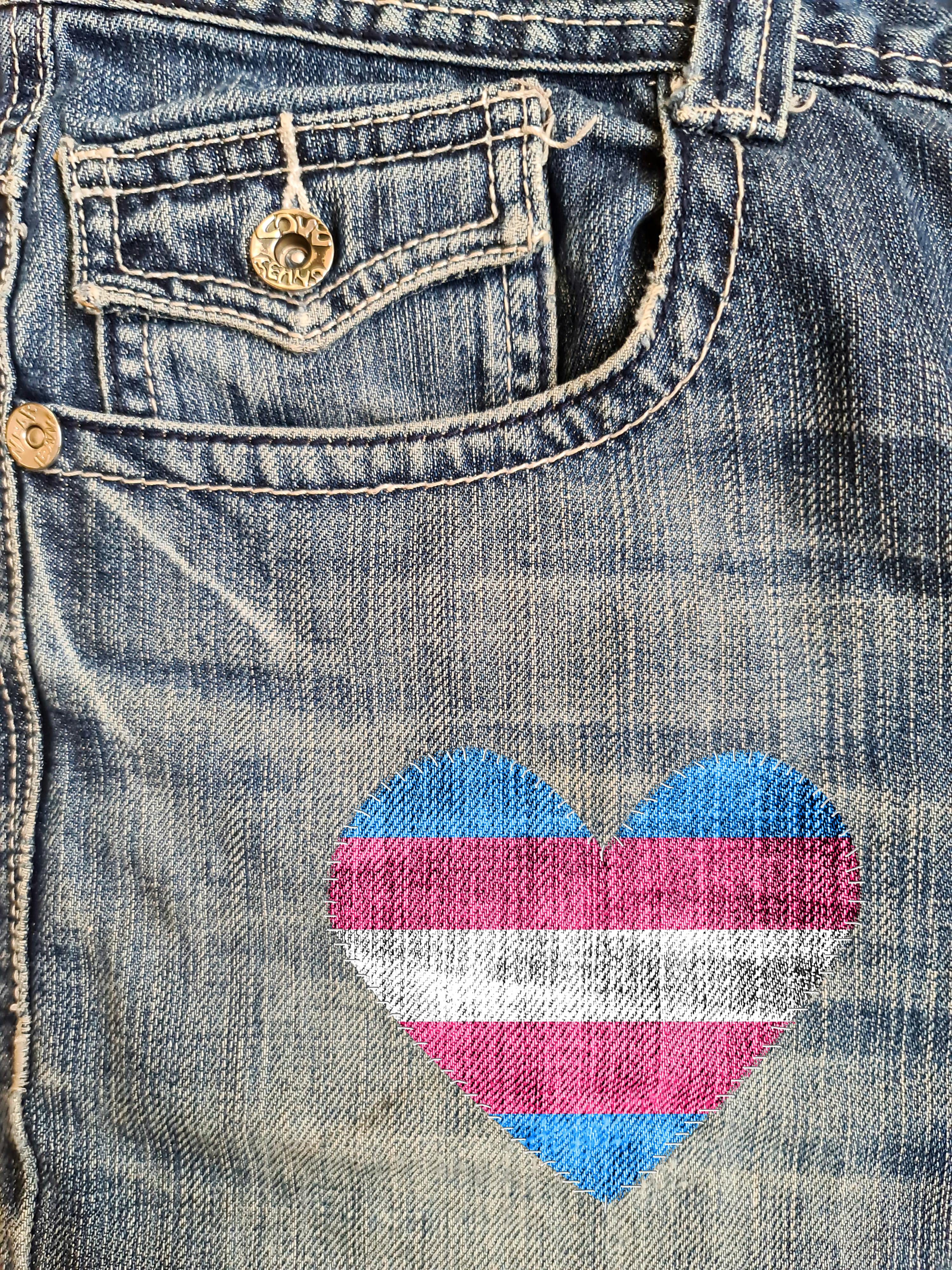 Close Up Shot of a Denim Jeans with Heart Shape · Free Stock Photo
