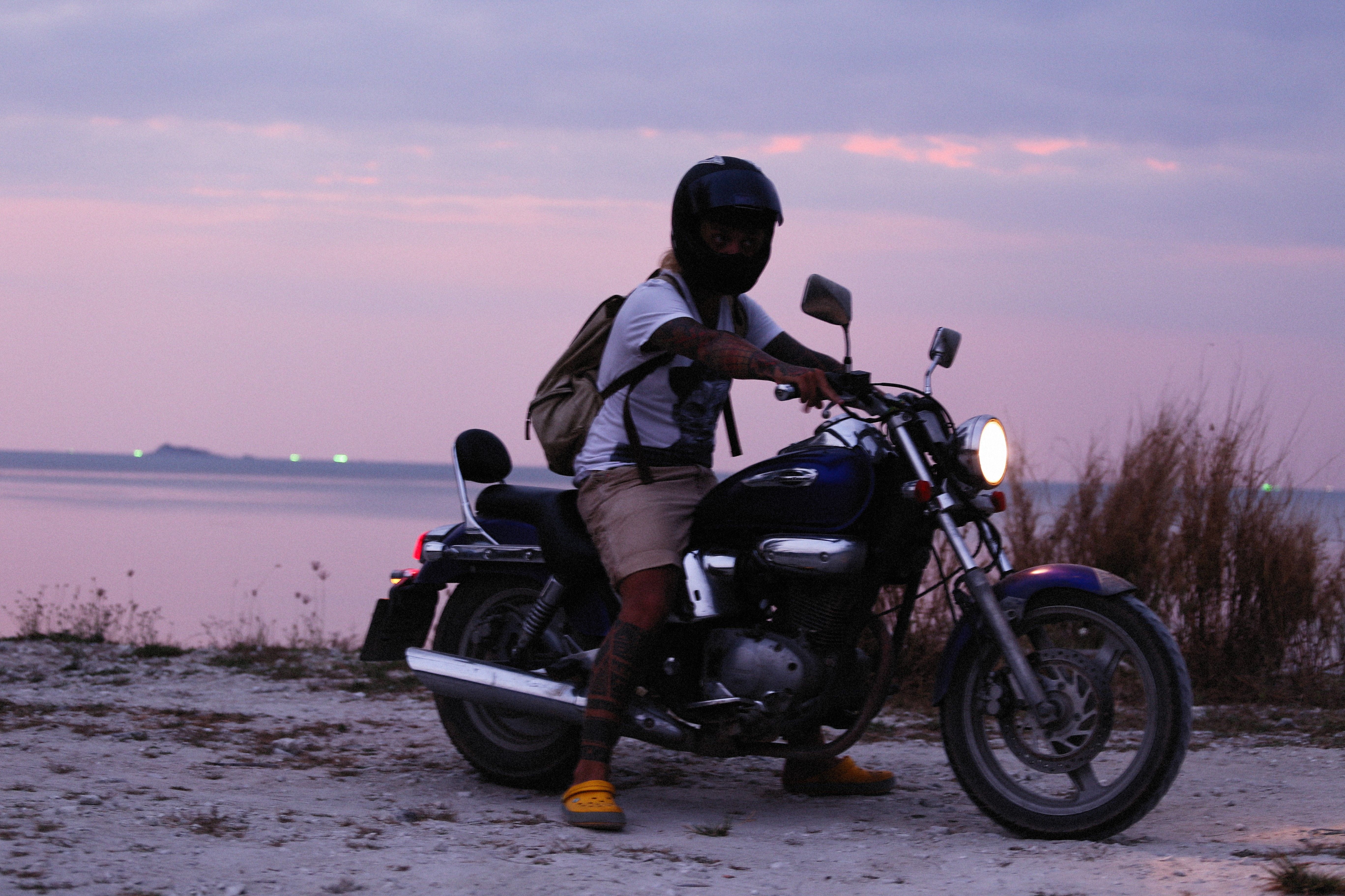 Man Posing on Motorcycle · Free Stock Photo