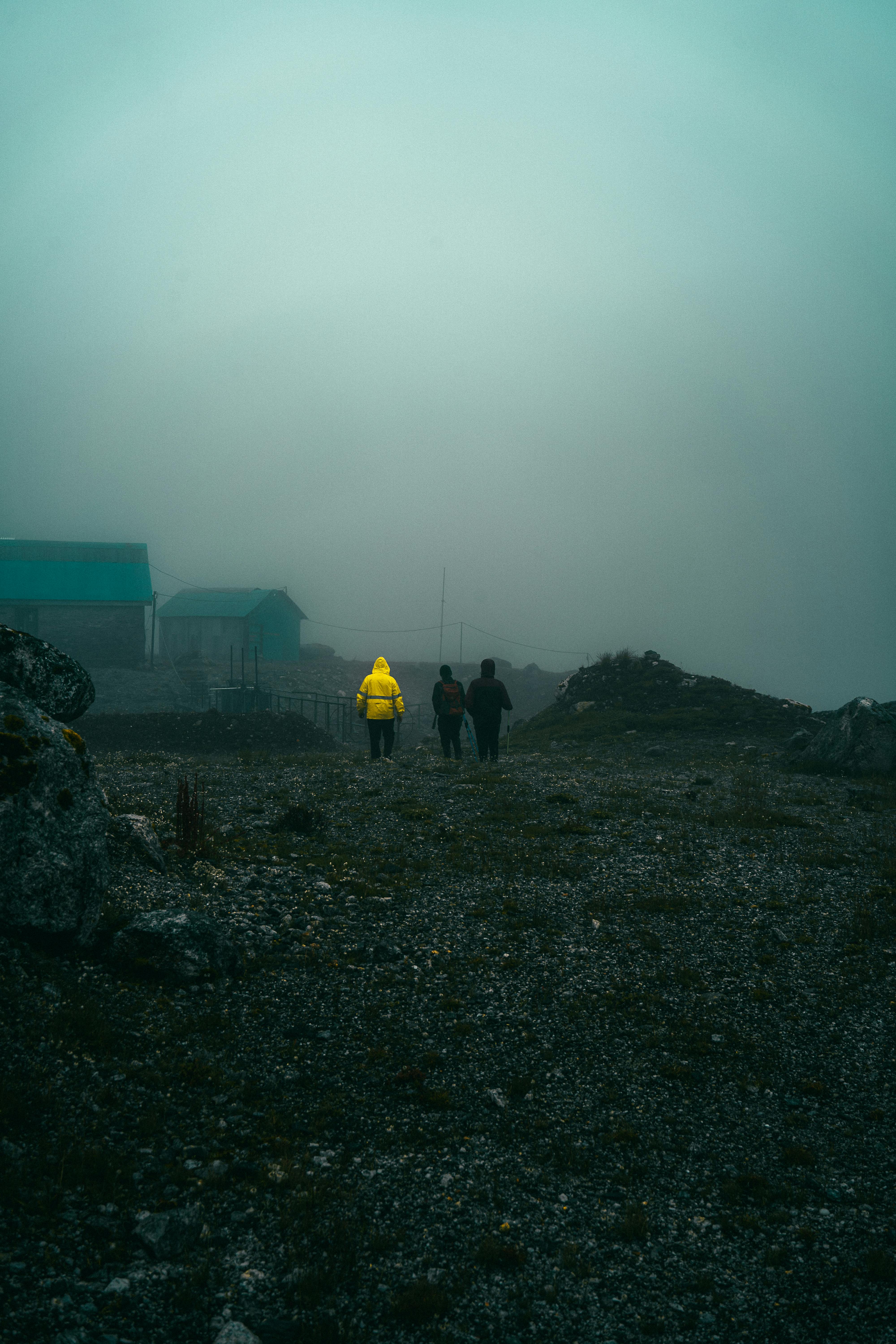 People Walking in a Village in Fog · Free Stock Photo