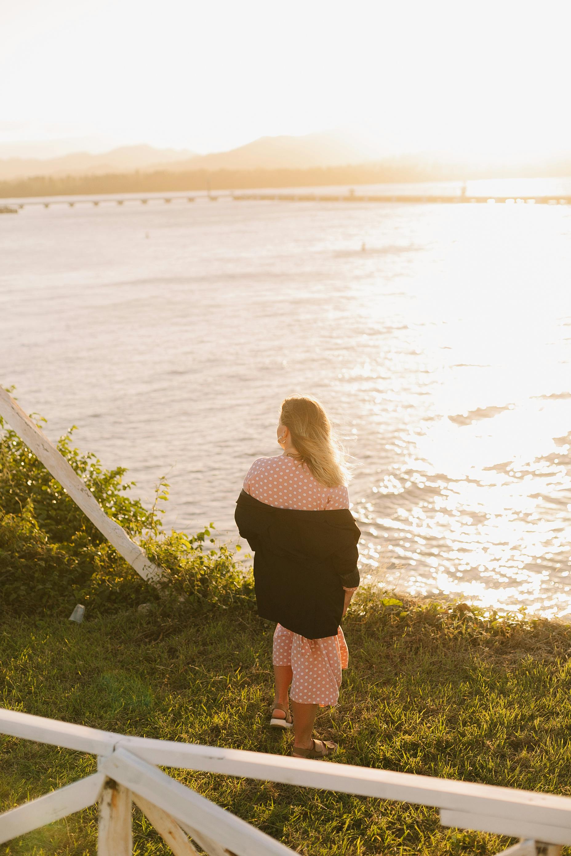 Women Walking Near Body of Water · Free Stock Photo