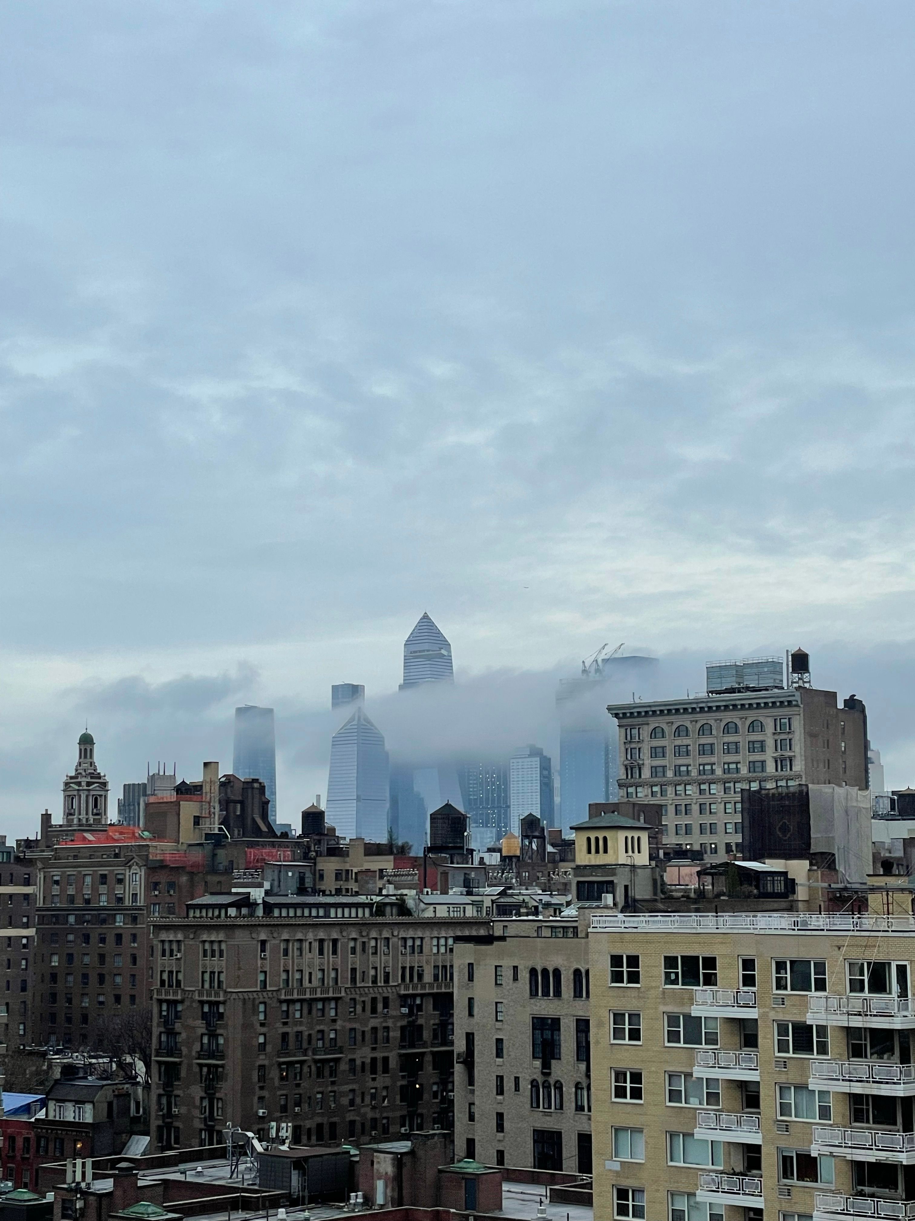 Photo of Buildings Under Cloudy Sky · Free Stock Photo