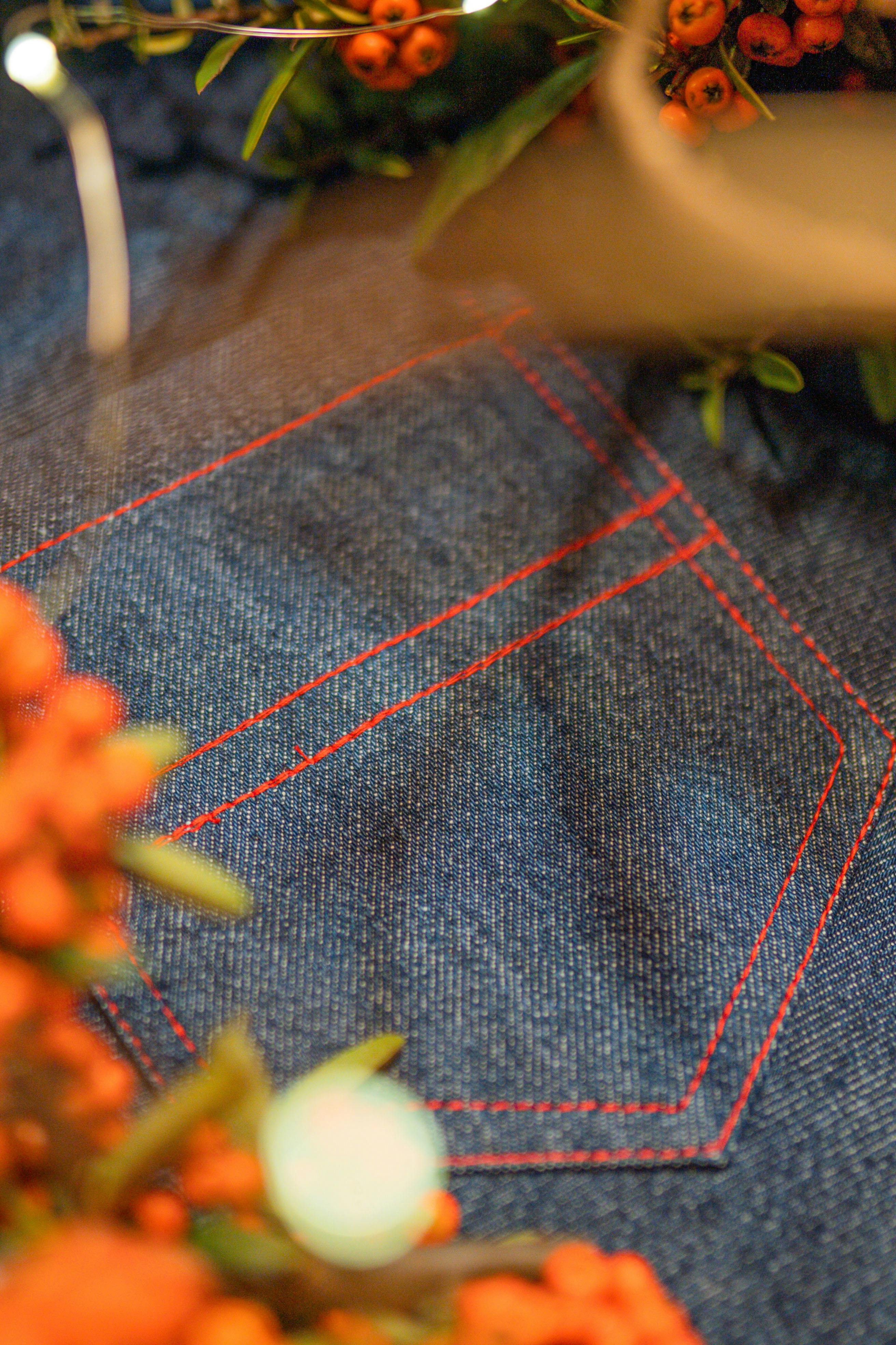 Red Stitching on Jeans · Free Stock Photo