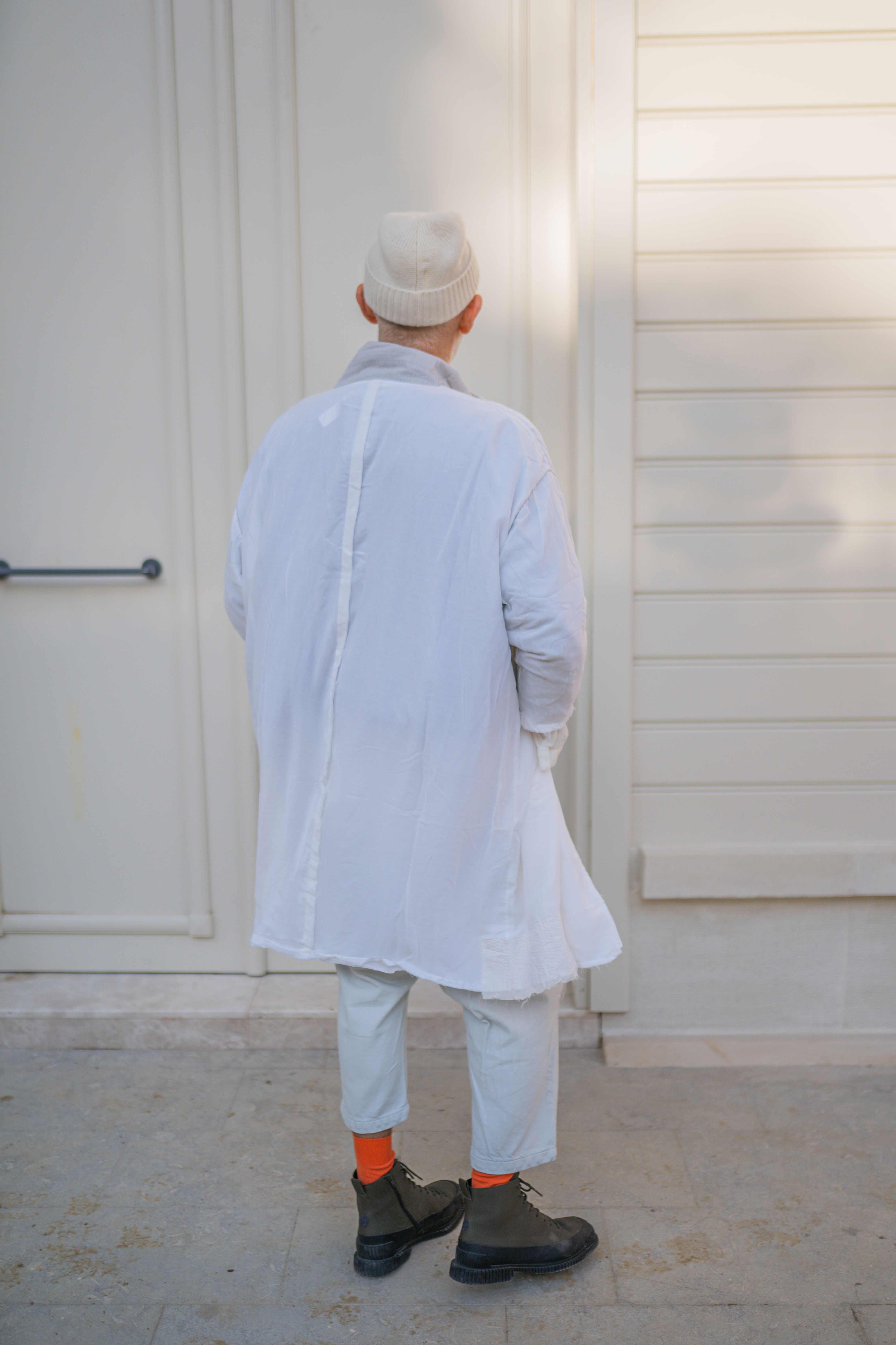 A Man in White Robe Standing · Free Stock Photo