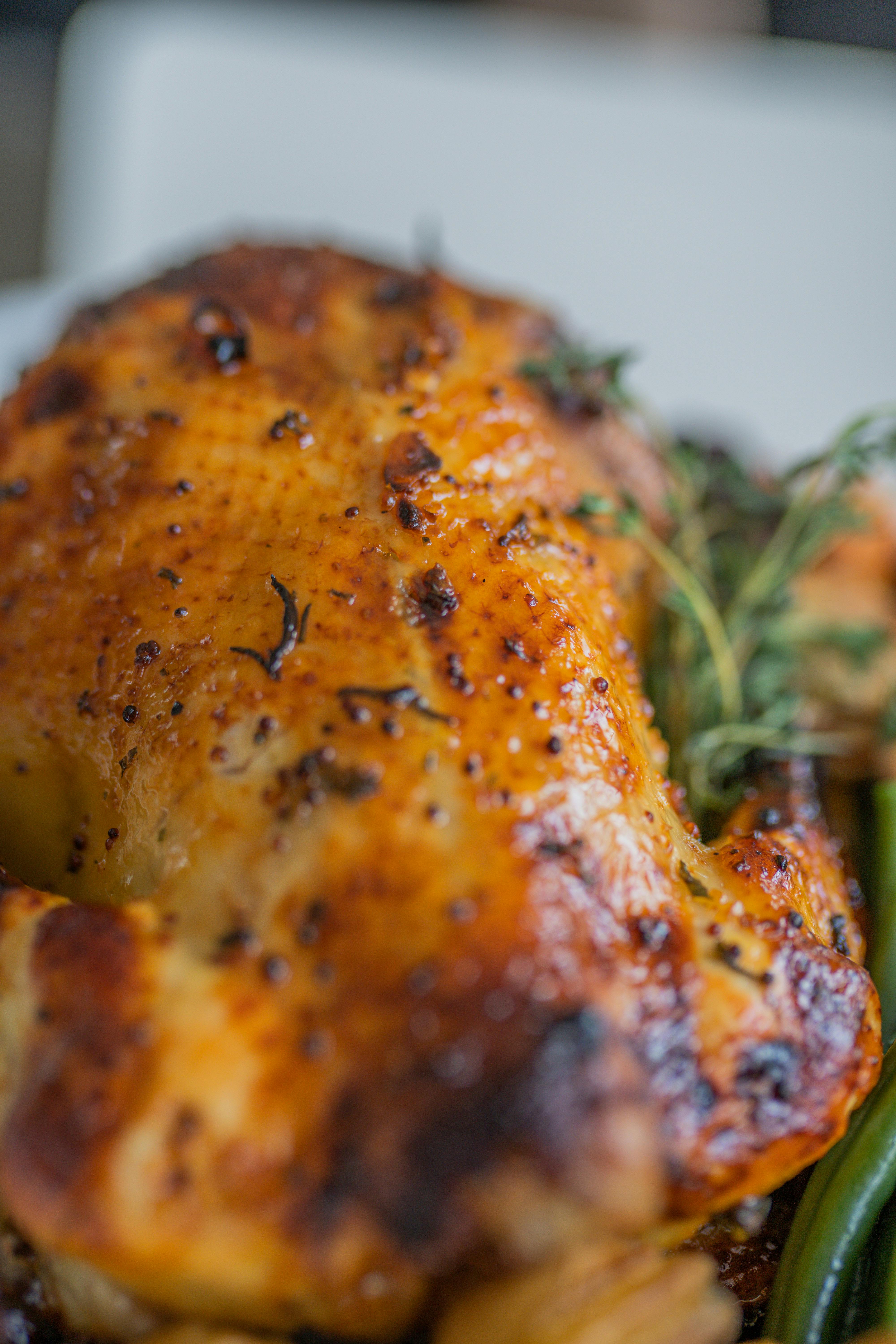 Close-Up Shot of a Roasted Chicken · Free Stock Photo