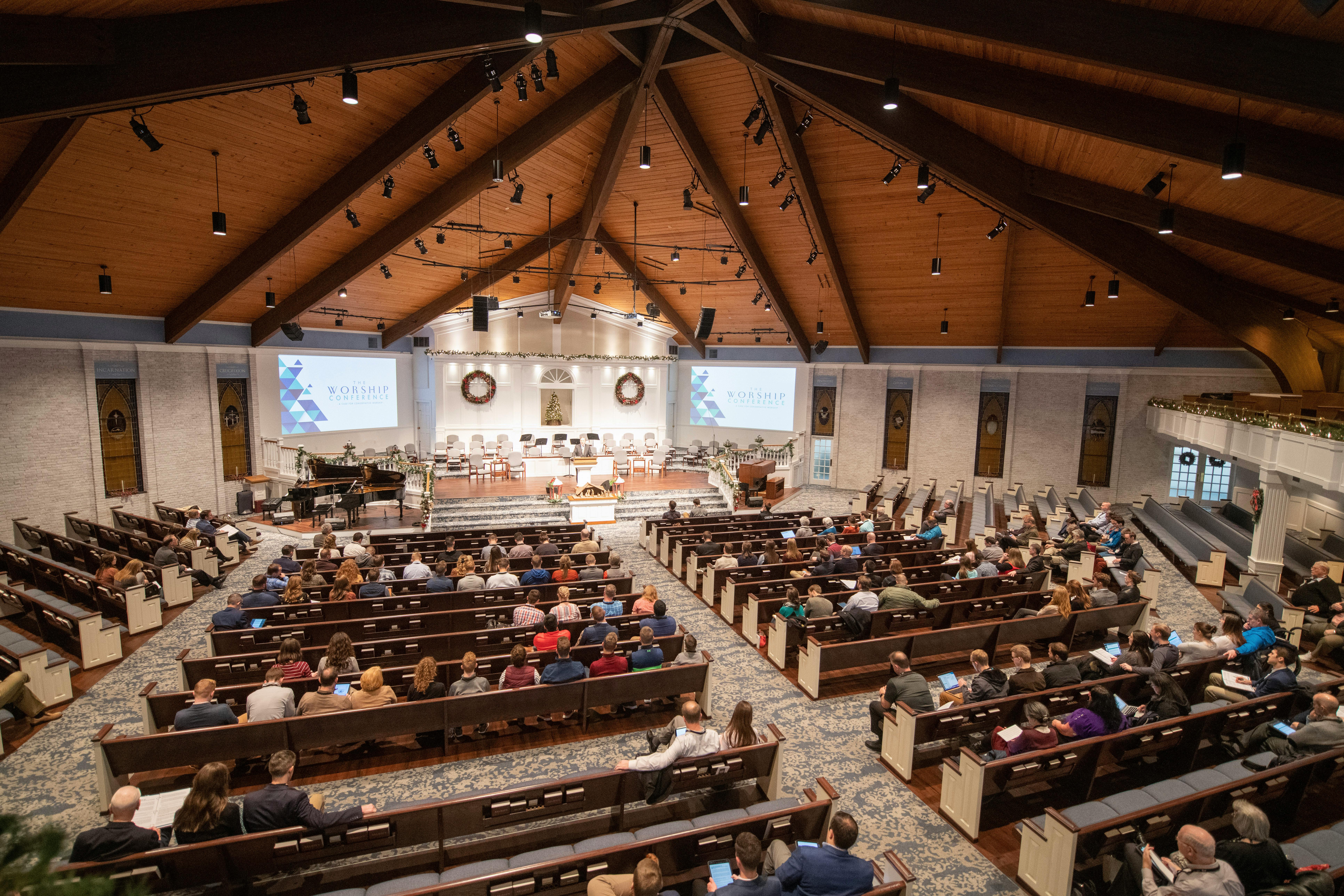 People in a Church Sitting Facing the Altar · Free Stock Photo