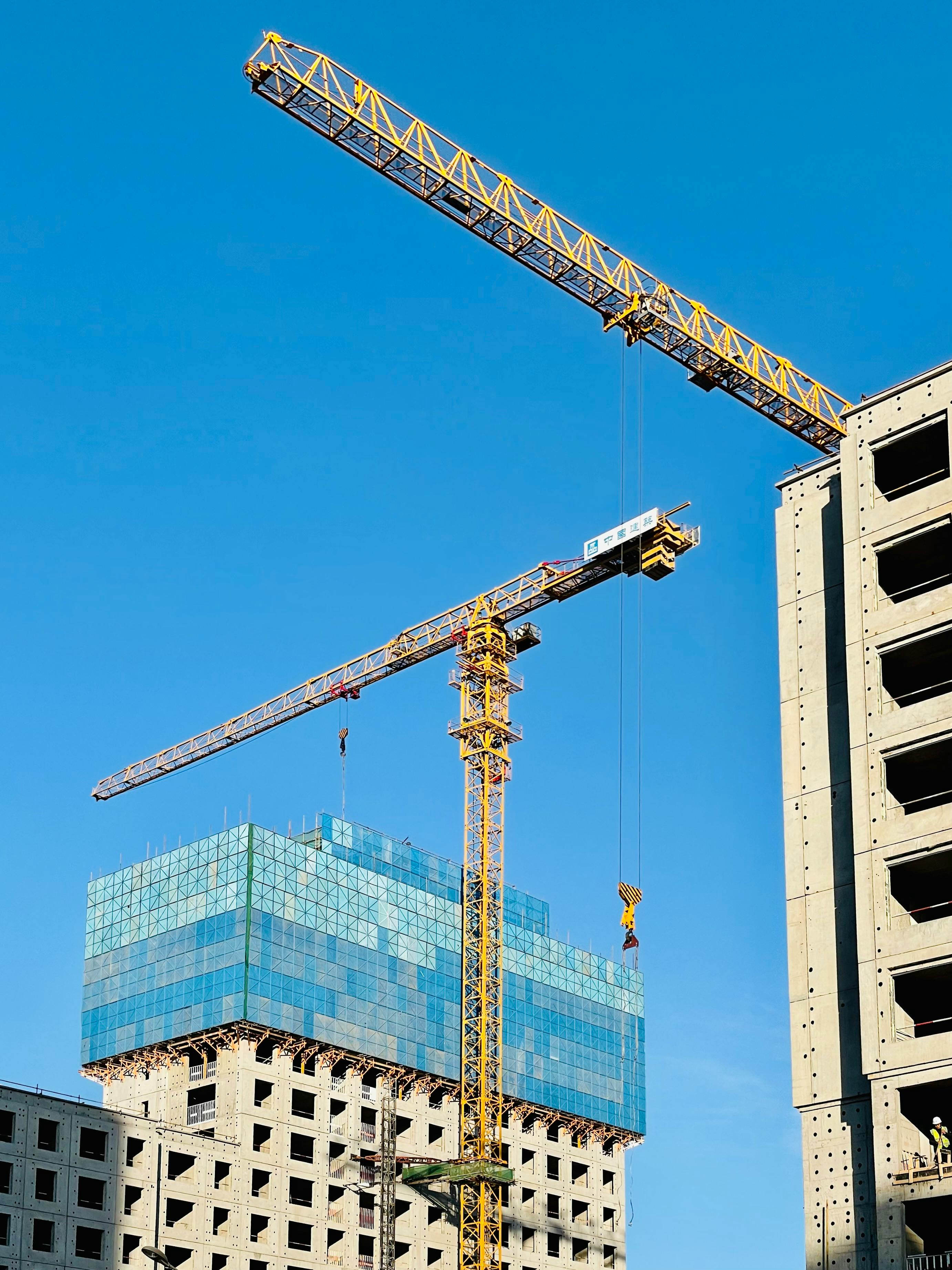 Photo of Two Tower Cranes · Free Stock Photo