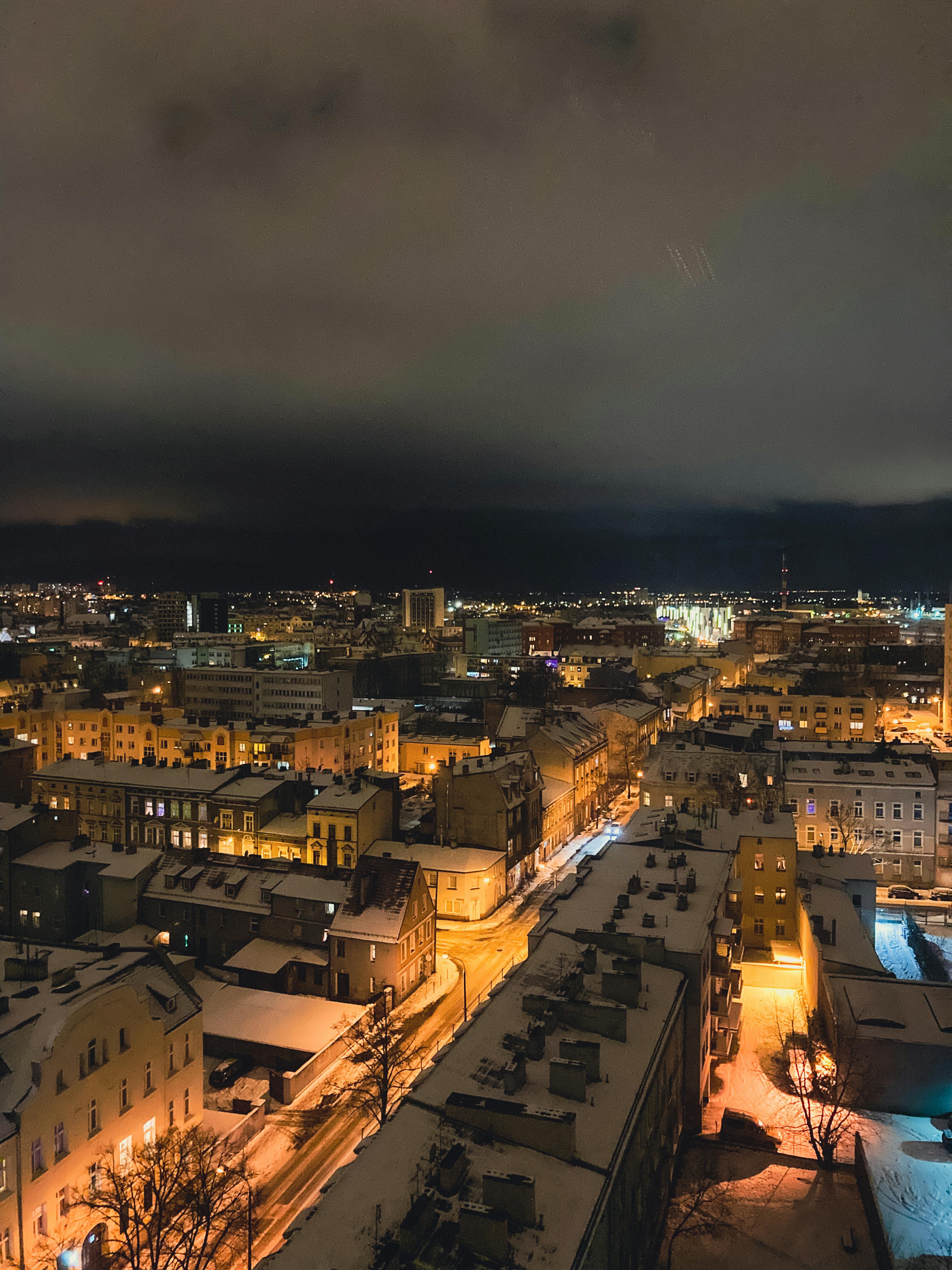 City With High Rise Buildings during Night Time · Free Stock Photo