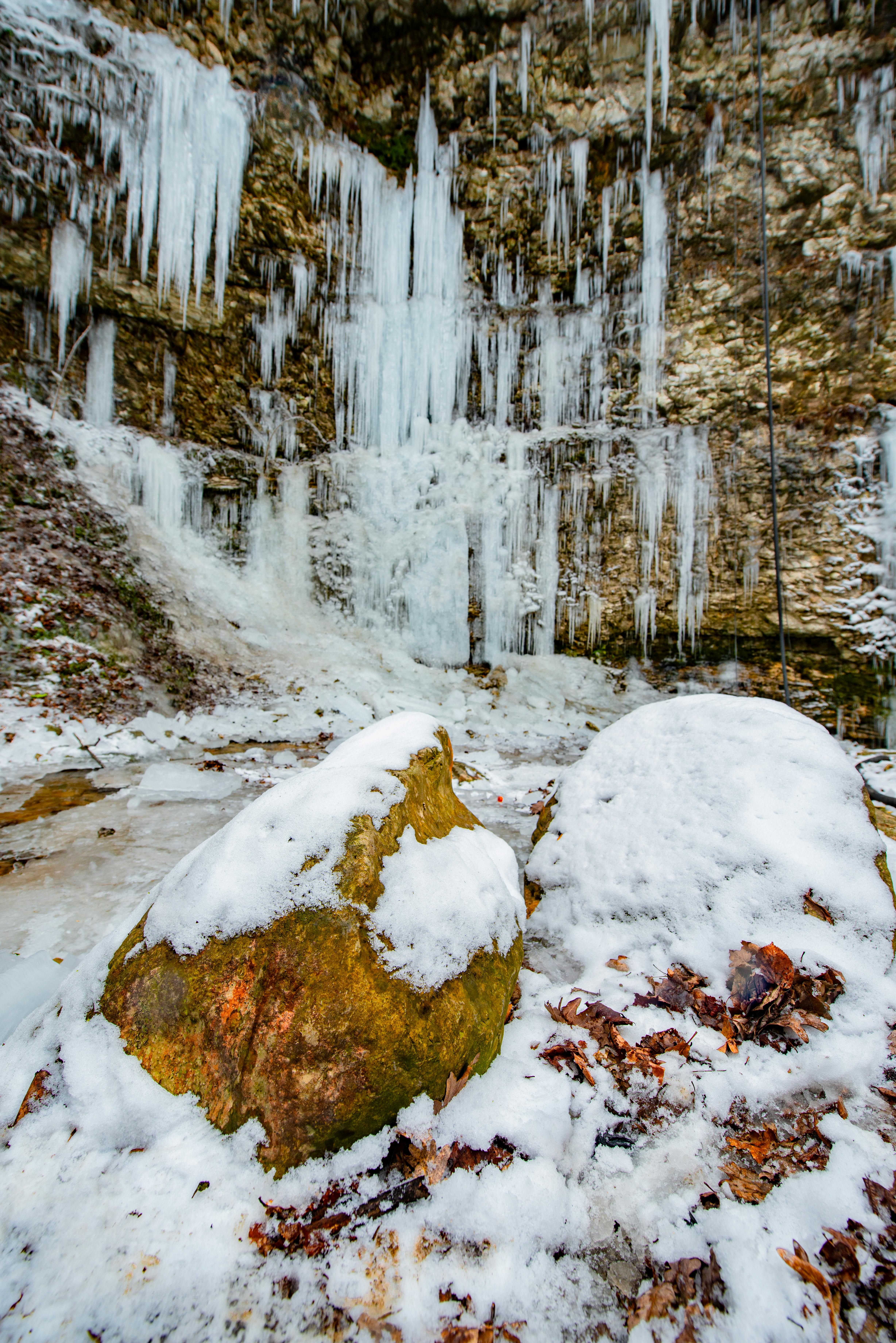 Snow on Rocks and Icicles on Mountain · Free Stock Photo