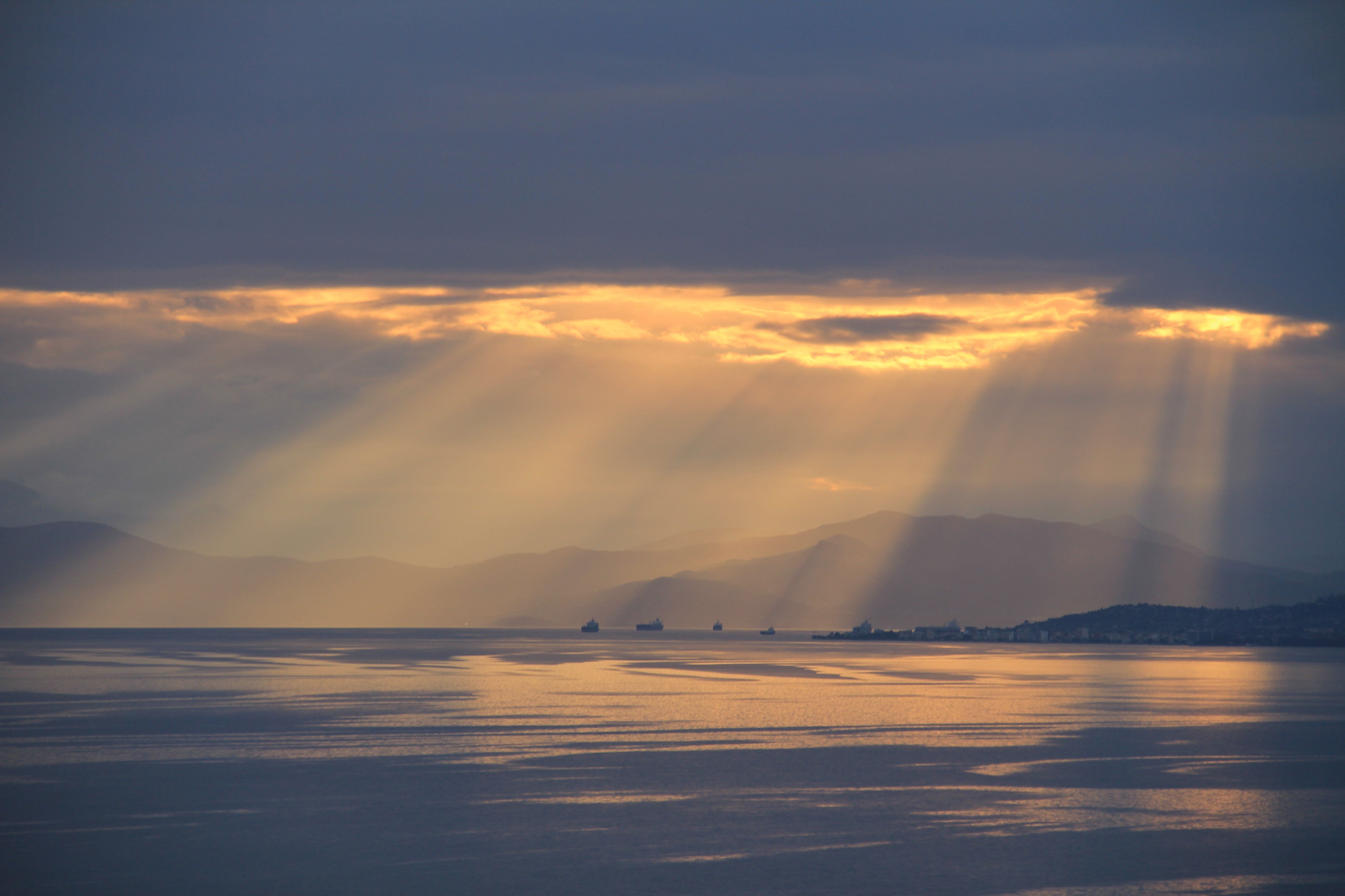 Rays of Sunlight Shining through Clouds · Free Stock Photo