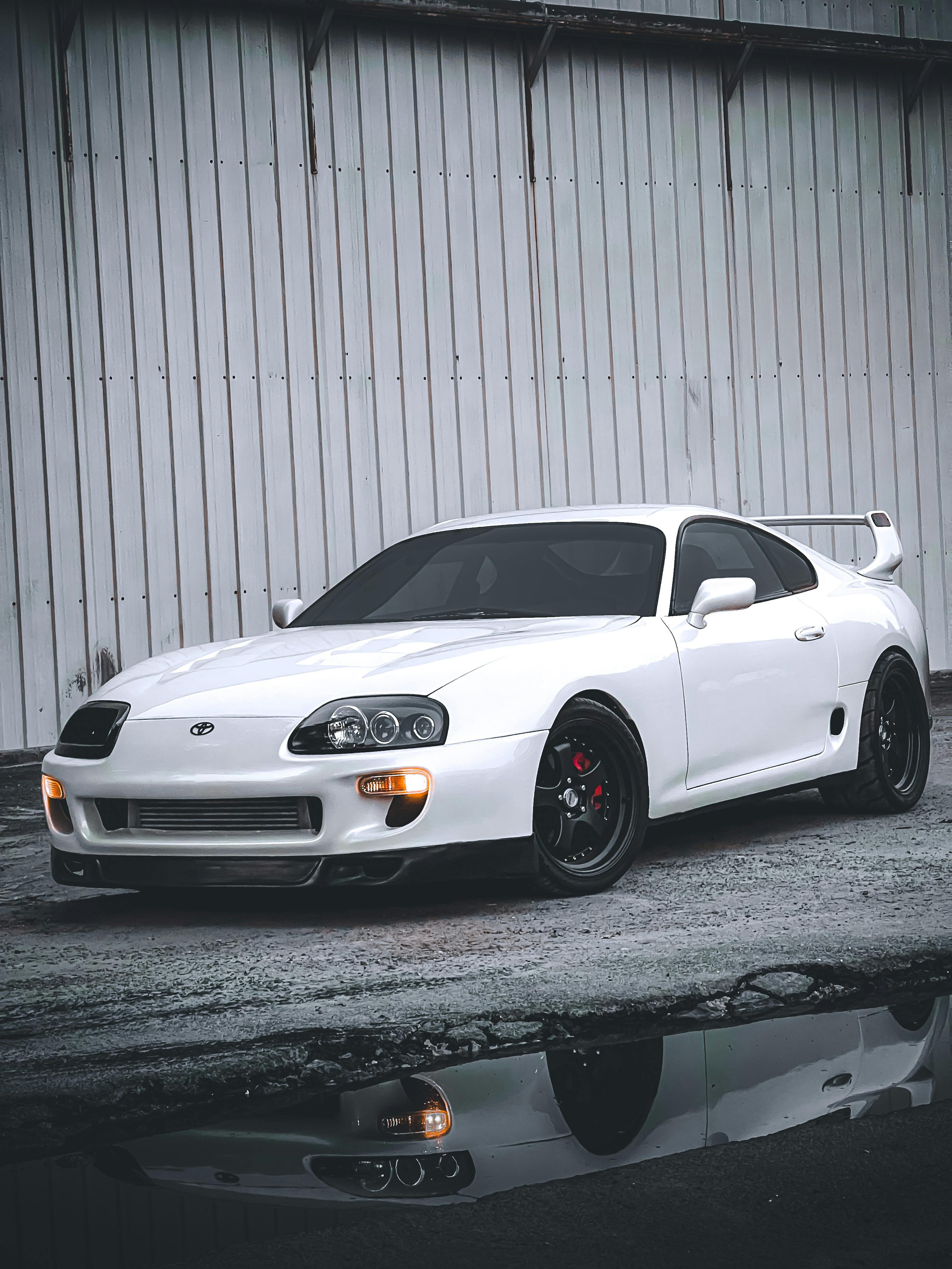 White Car Parked on a Lot · Free Stock Photo