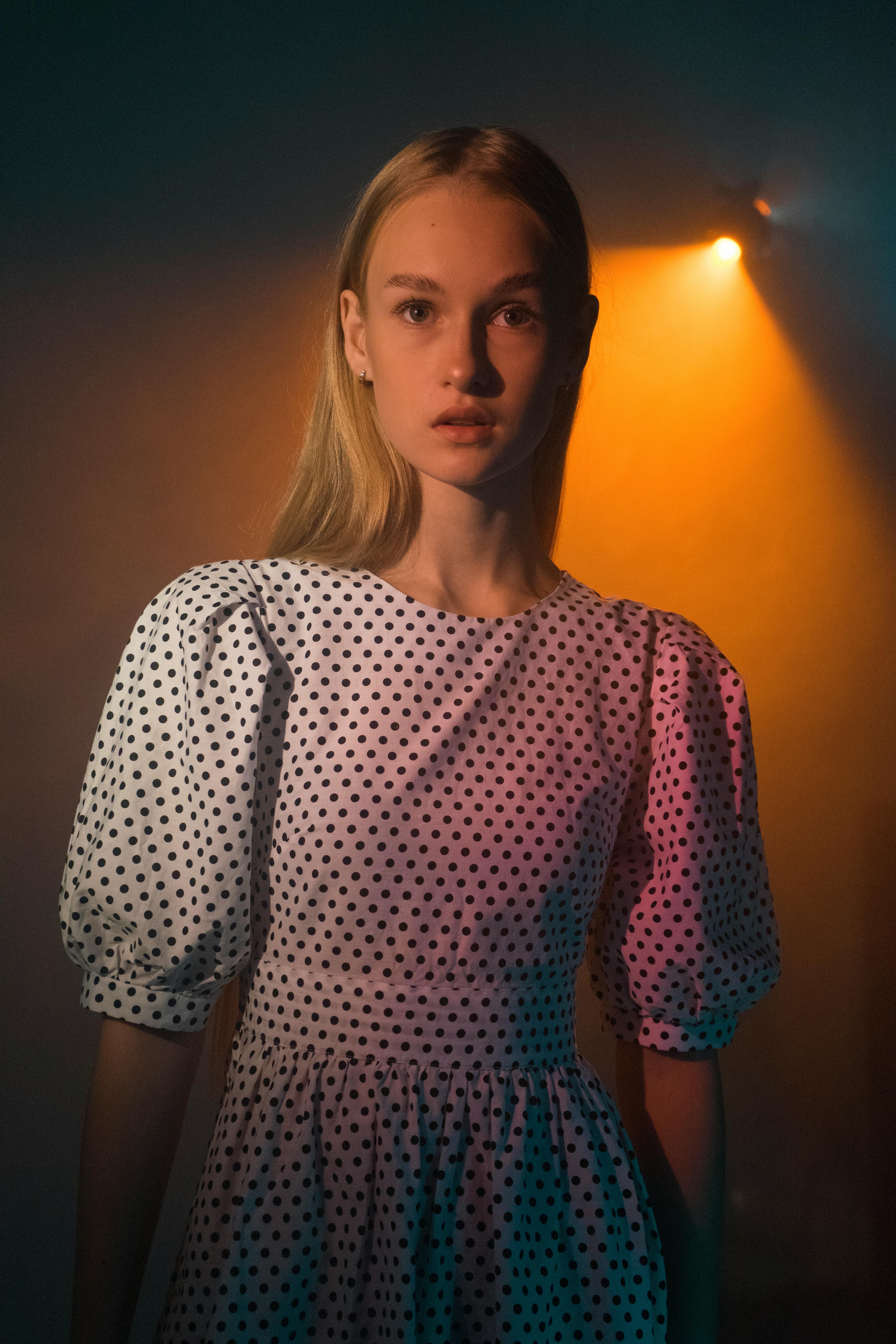 Back View of a Girl Holding Hat · Free Stock Photo