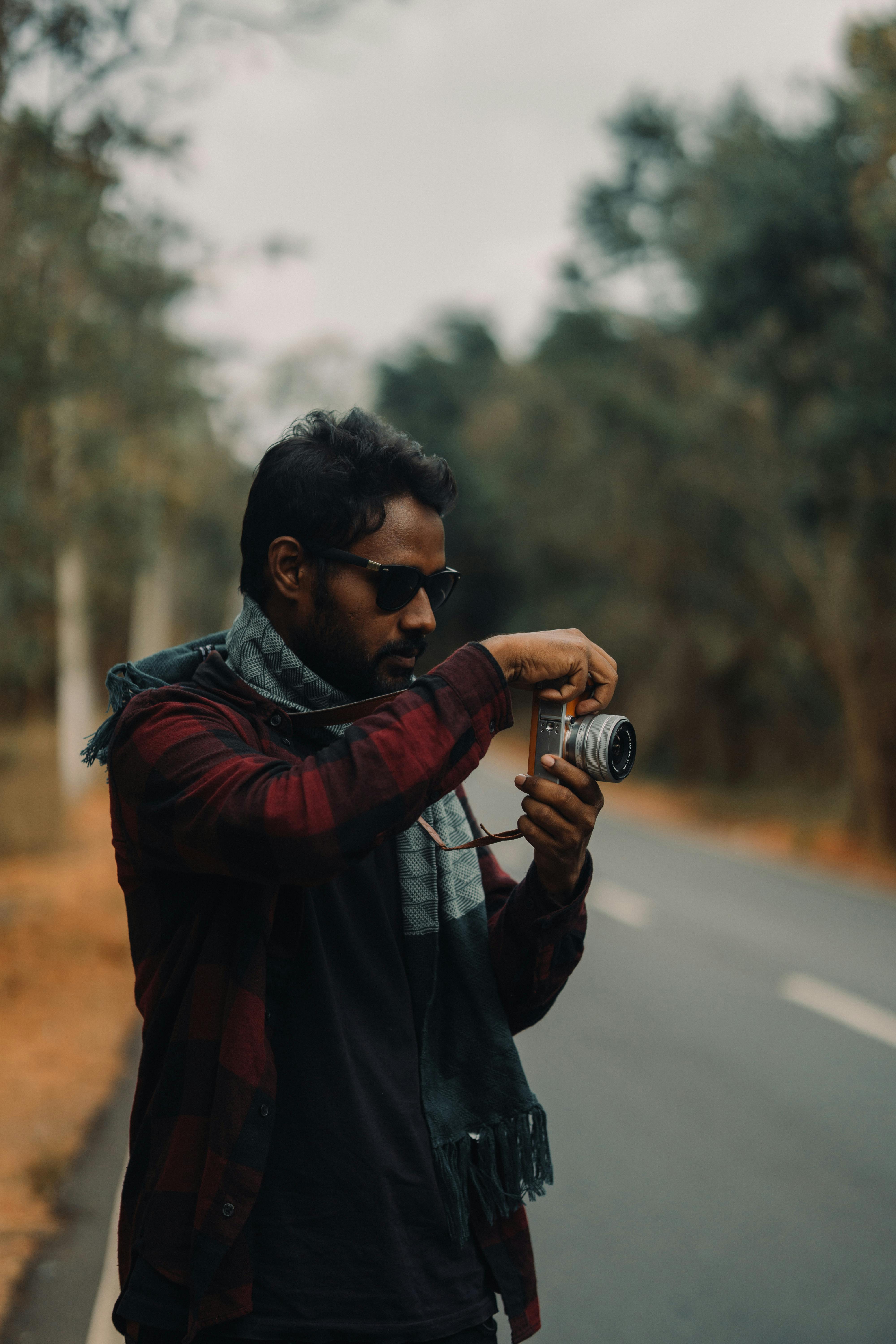 Man Using Camera · Free Stock Photo