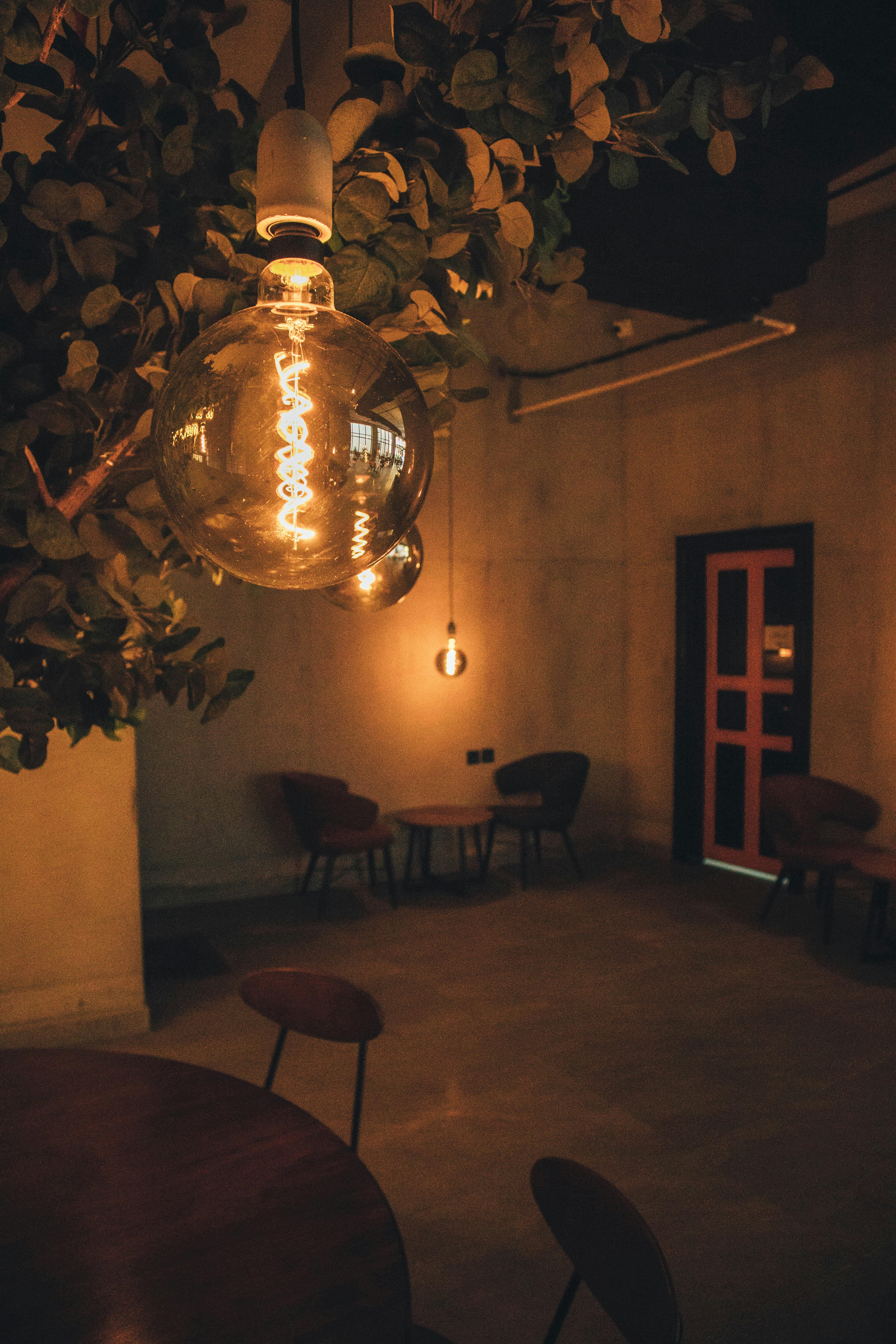 Round Light Bulb over Table · Free Stock Photo