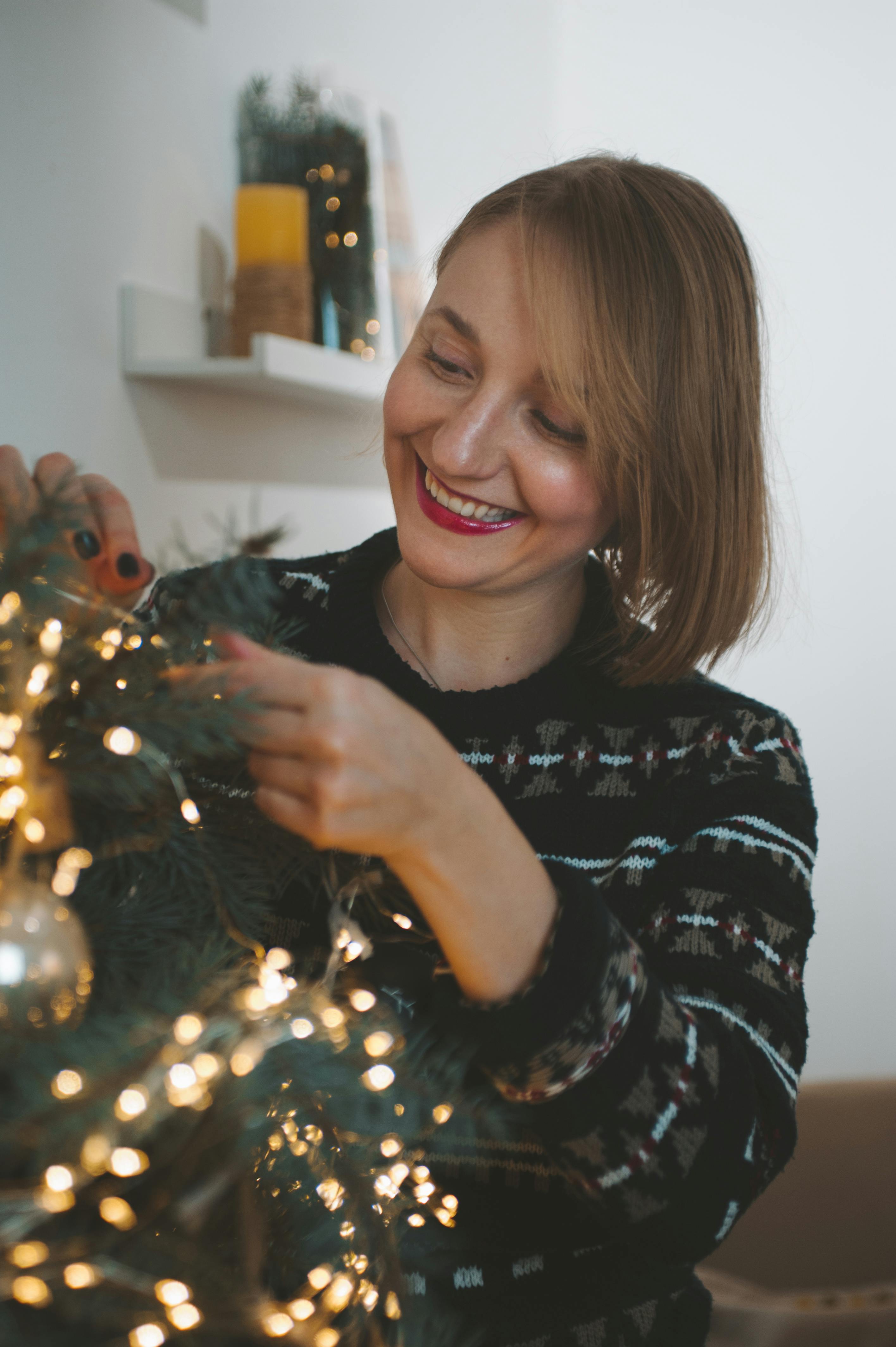 Person at Christmas Tree · Free Stock Photo