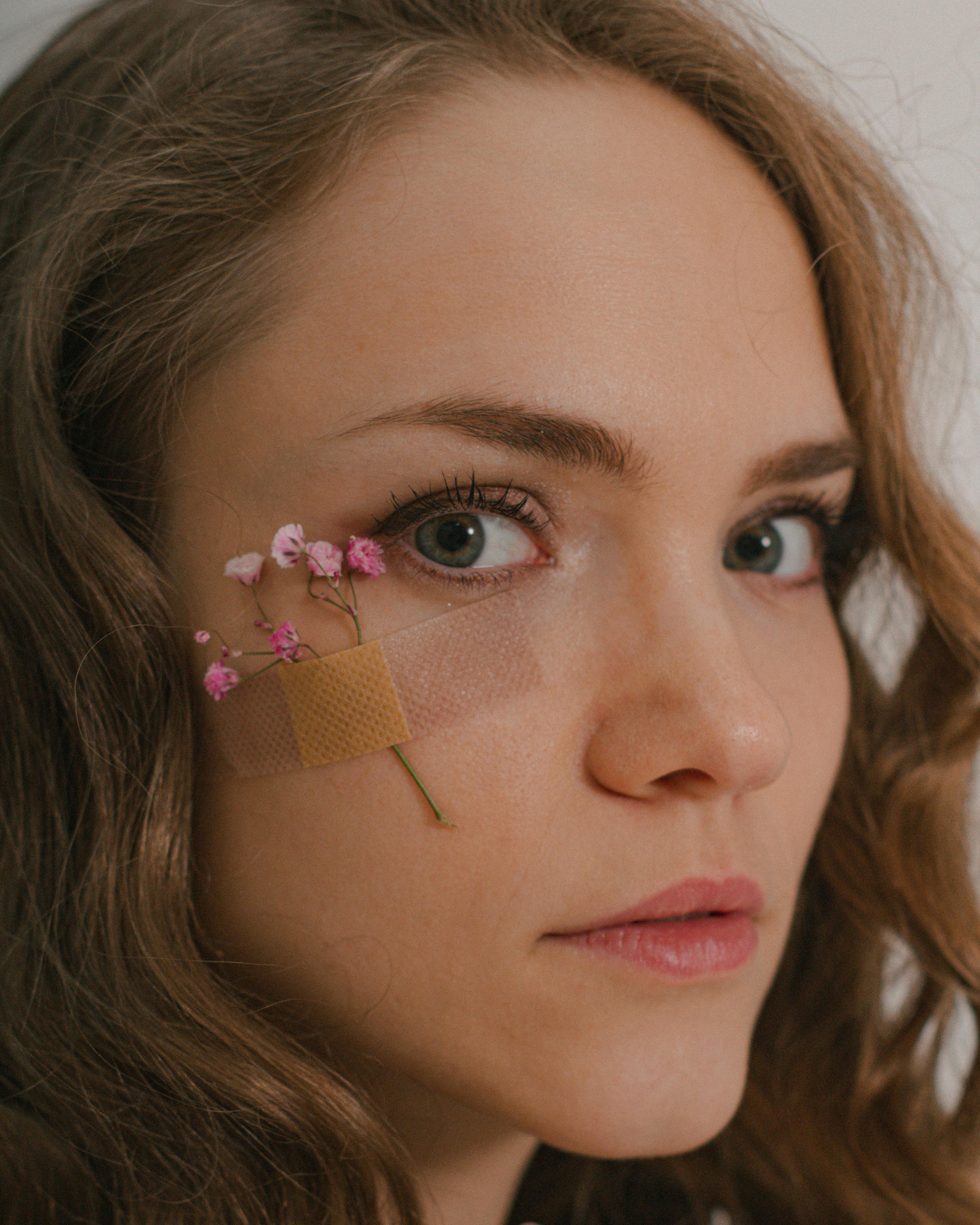 Woman with Band Aid on Her Face · Free Stock Photo