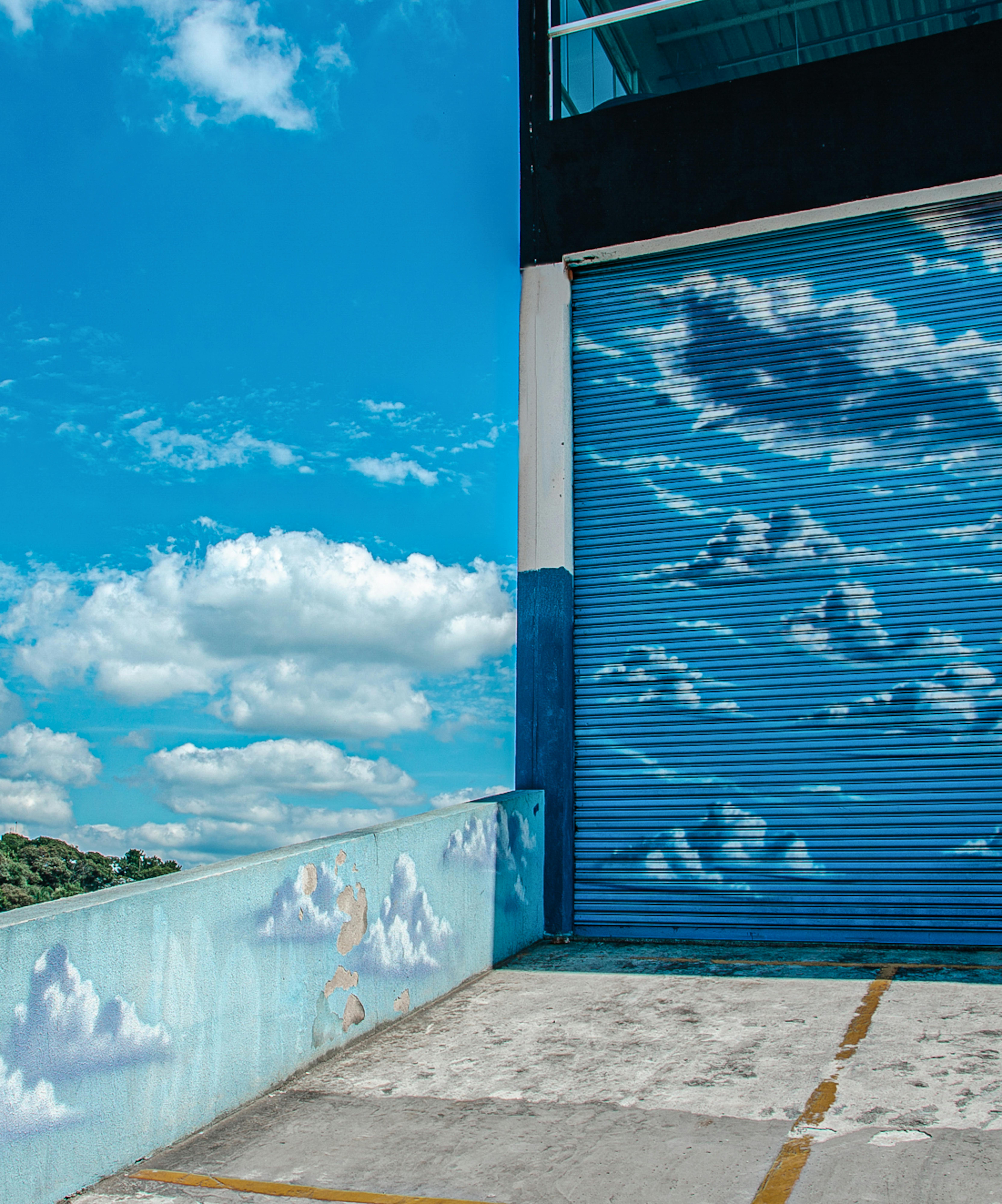 Mural Painting on the Wall of the Rooftop of a Building · Free Stock Photo