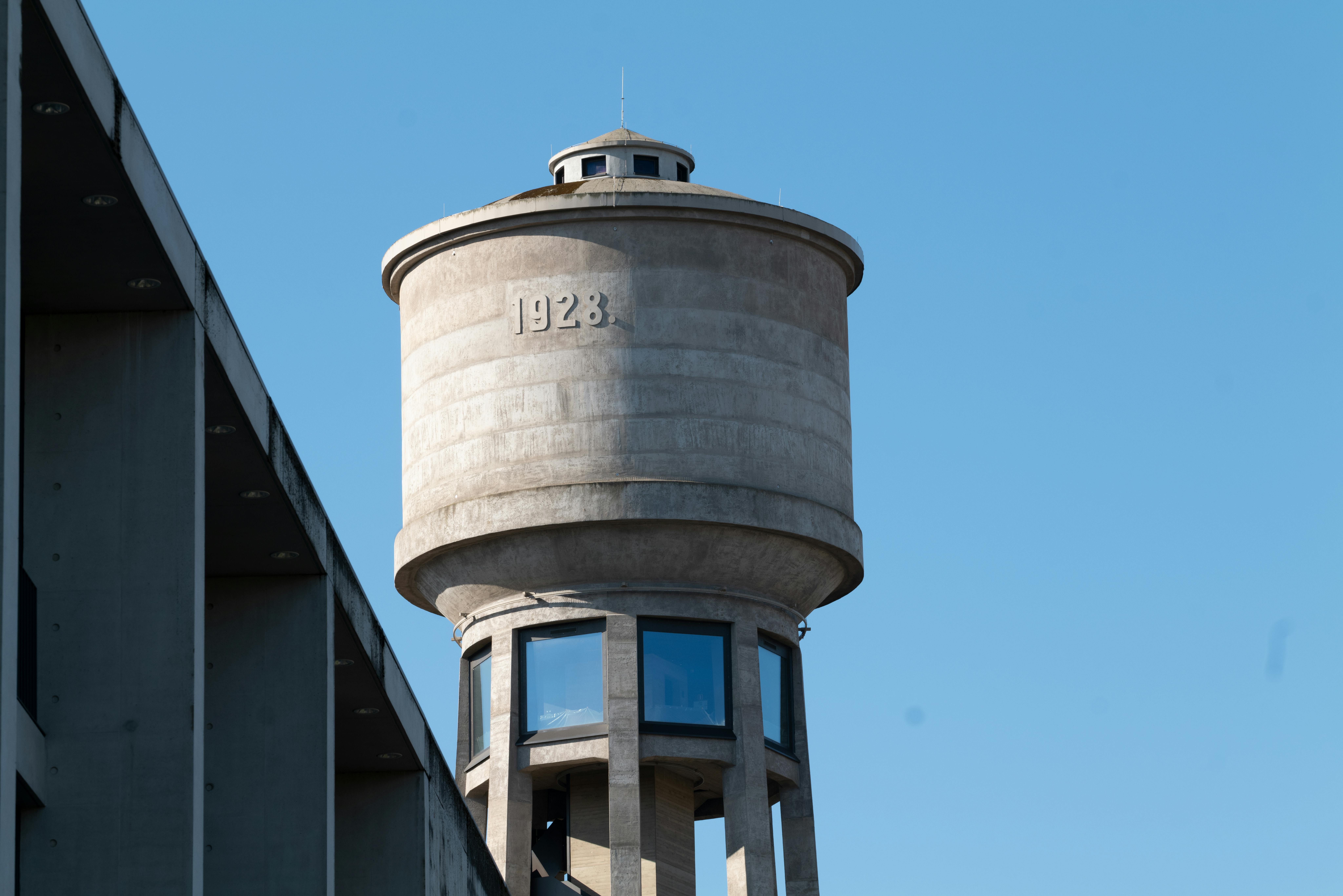 Water Tower Under Blue Sky · Free Stock Photo