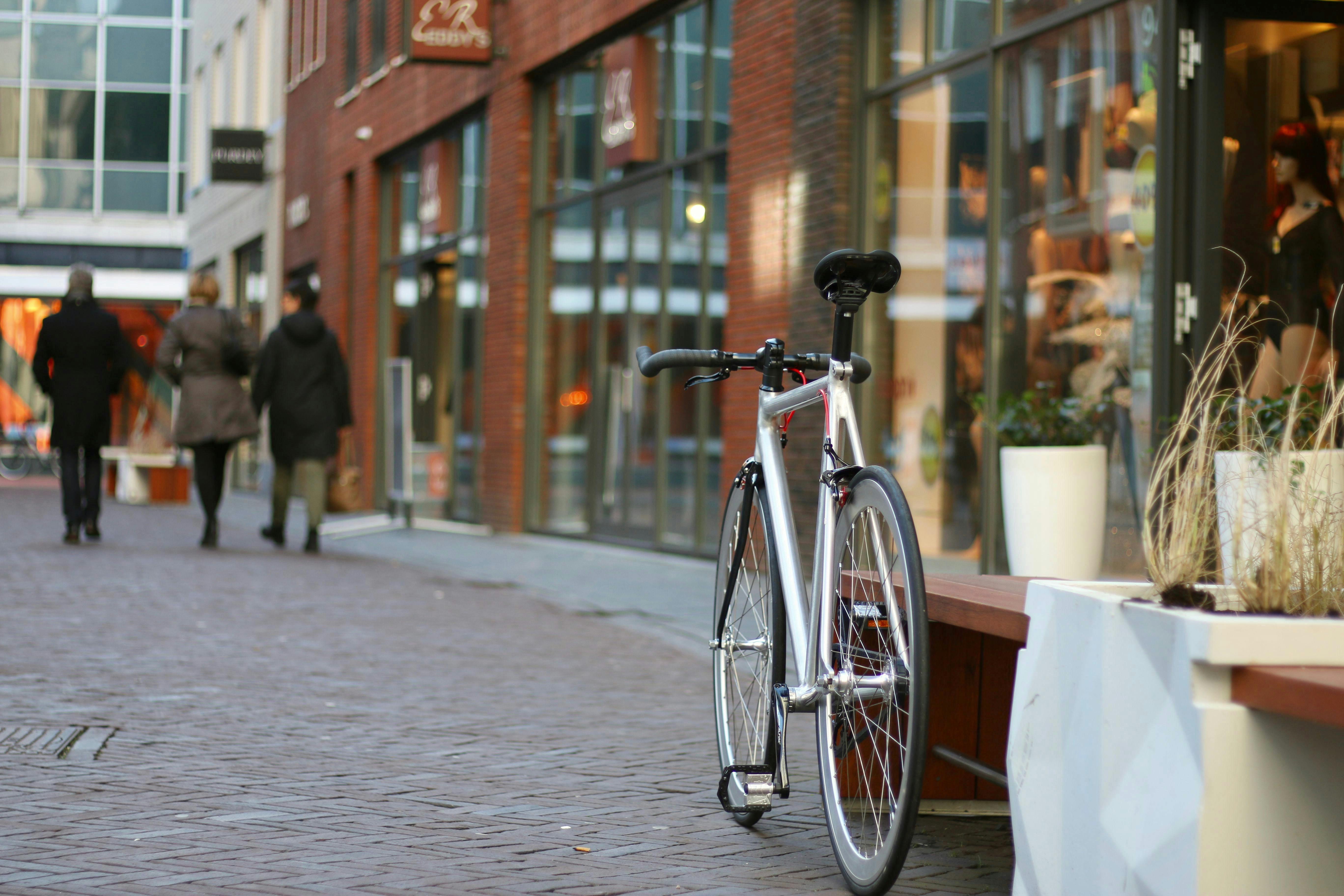 Bike Parked Beside Bench · Free Stock Photo