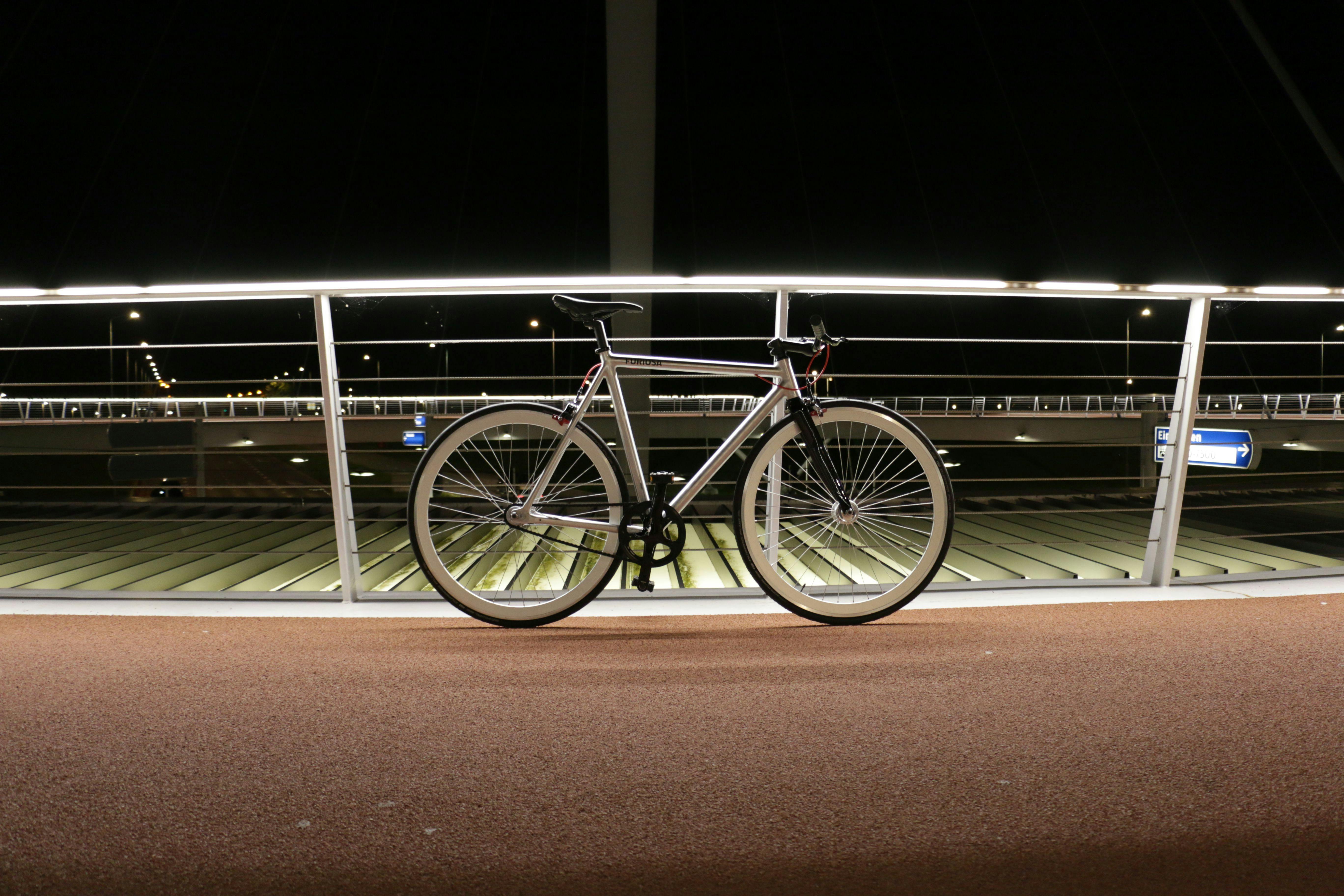 Black and Gray Bicycle Parked on the Street · Free Stock Photo