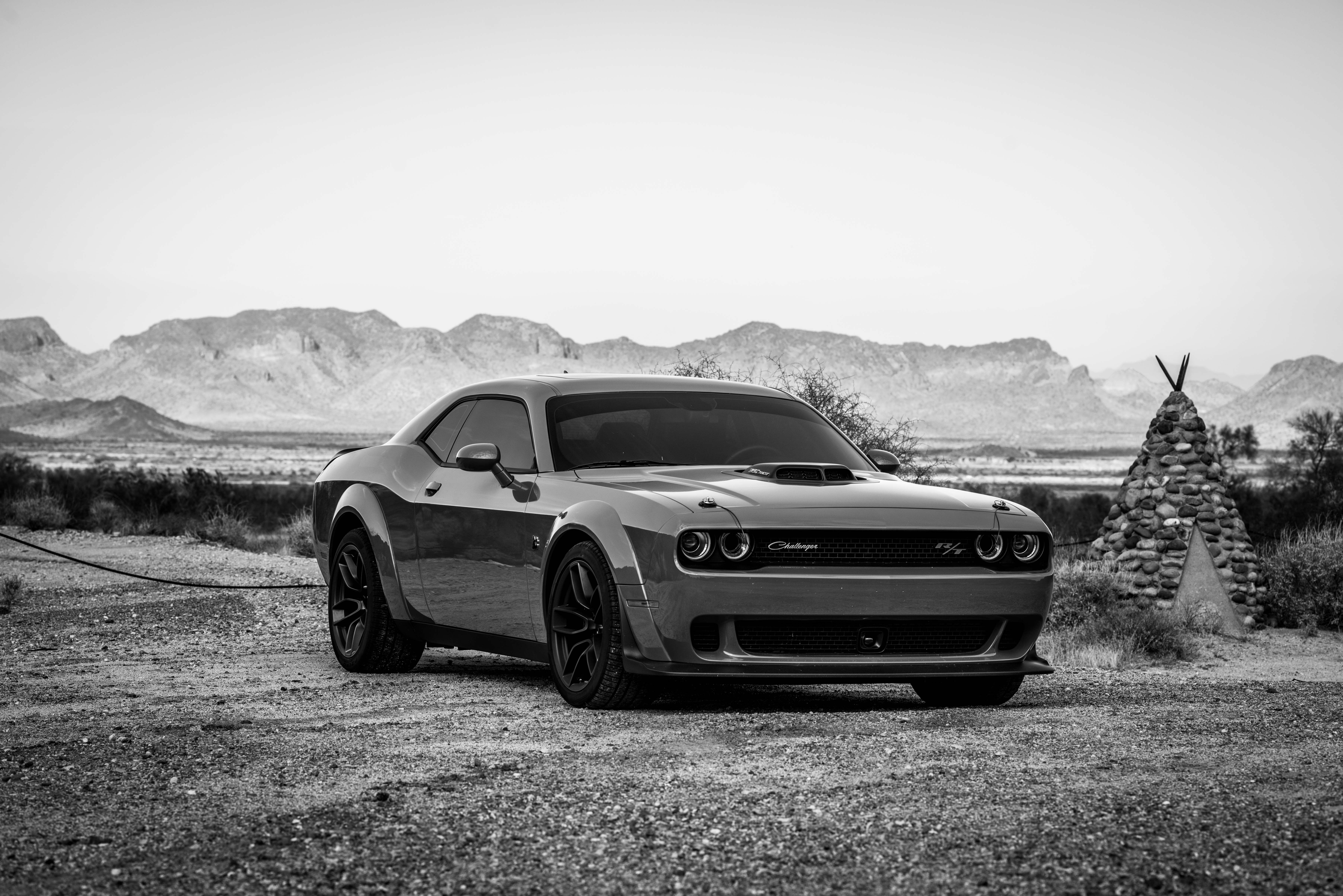 Grayscale Photo of a Muscle Car · Free Stock Photo