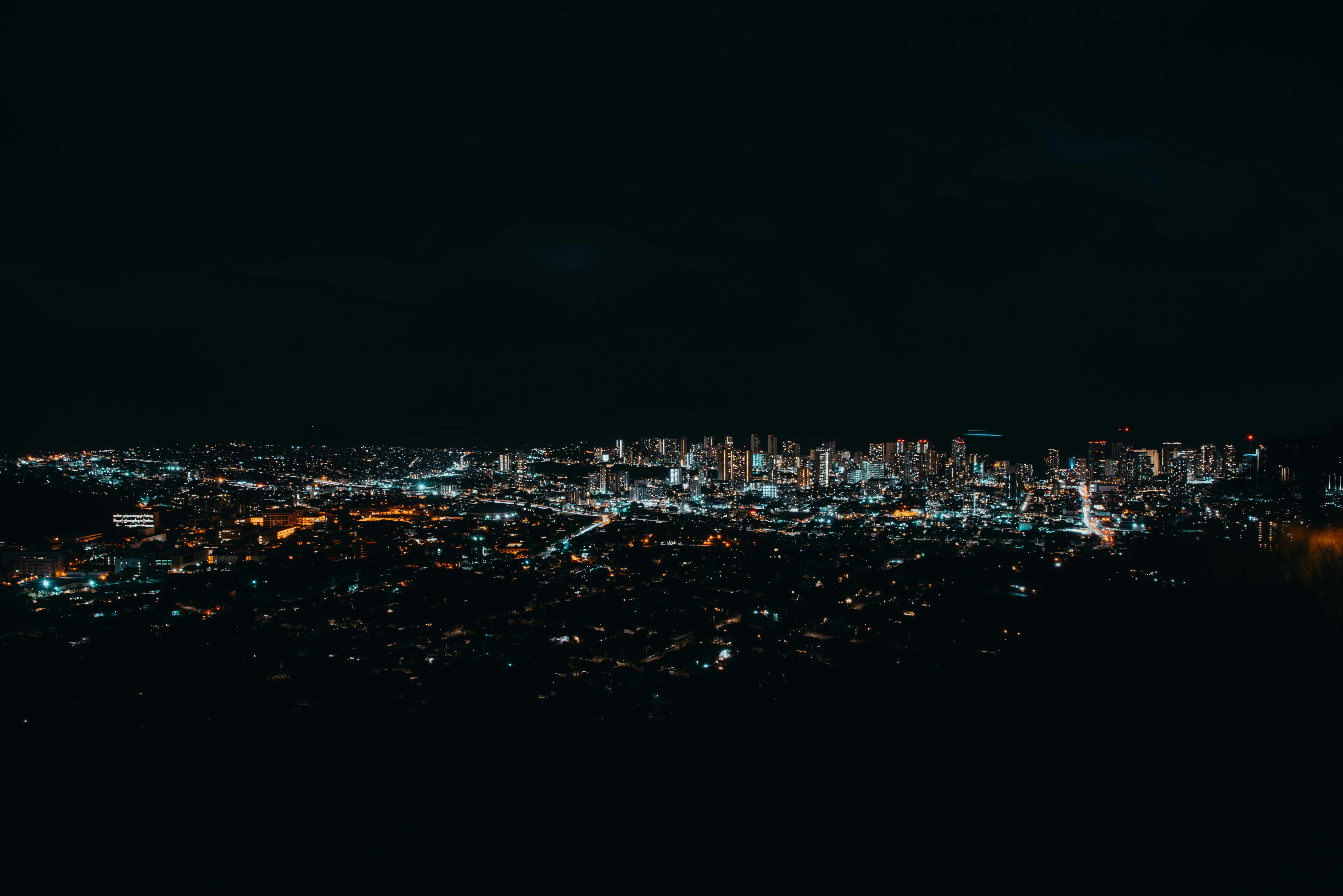 Cityscape over the Horizon during Dusk · Free Stock Photo