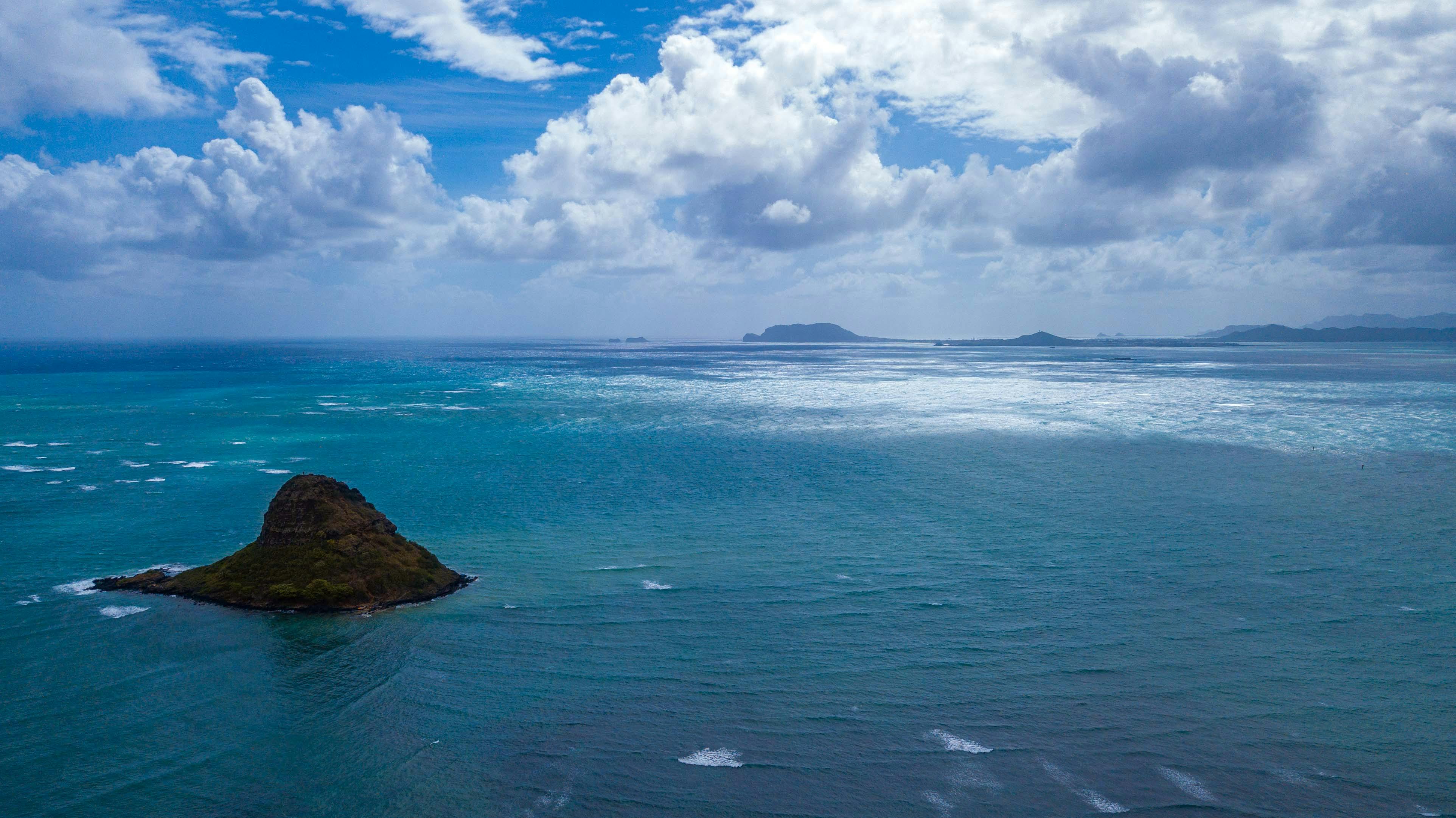 Building on Island on Sea Shore · Free Stock Photo
