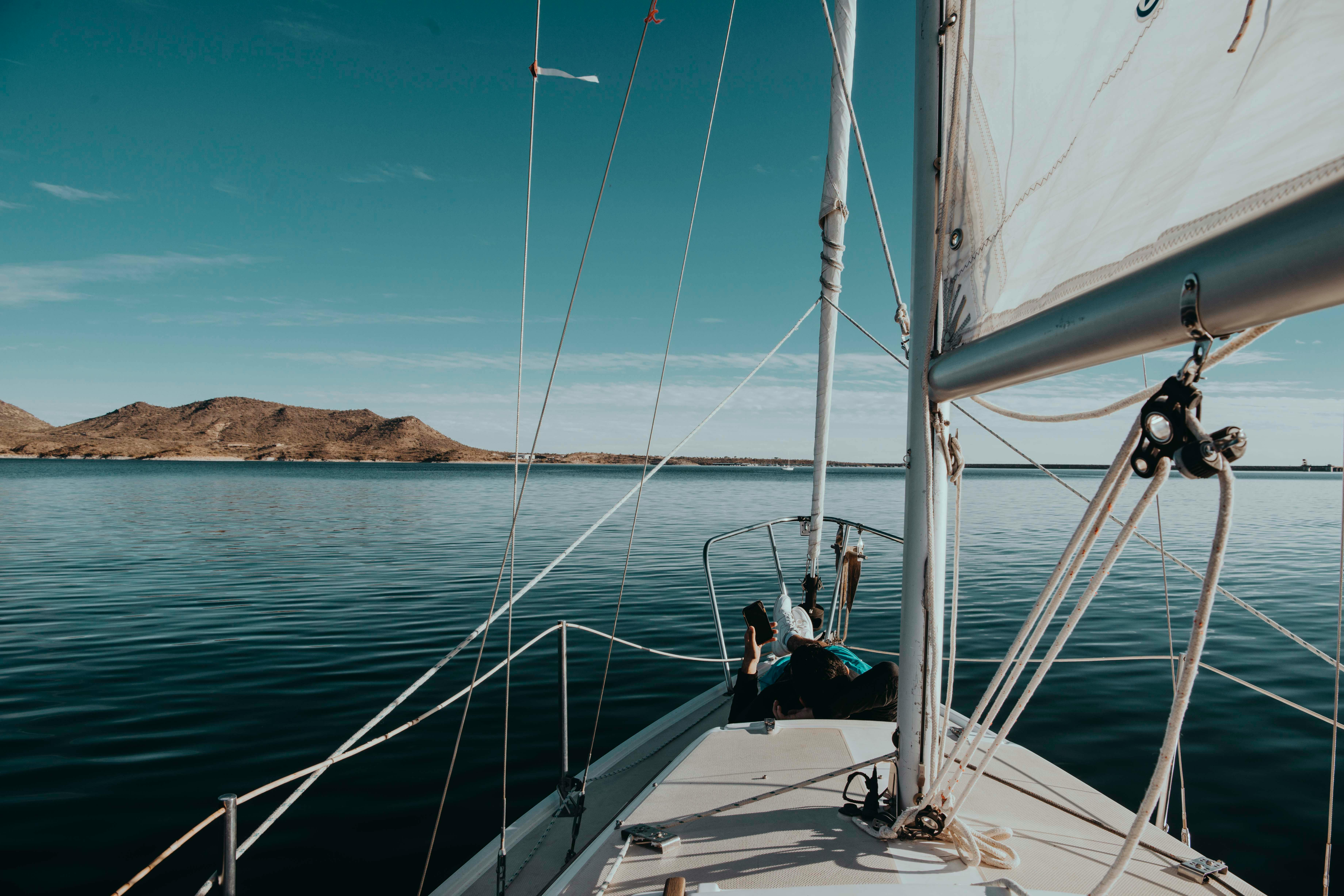 Board Of Sailboat On Sea Free Stock Photo