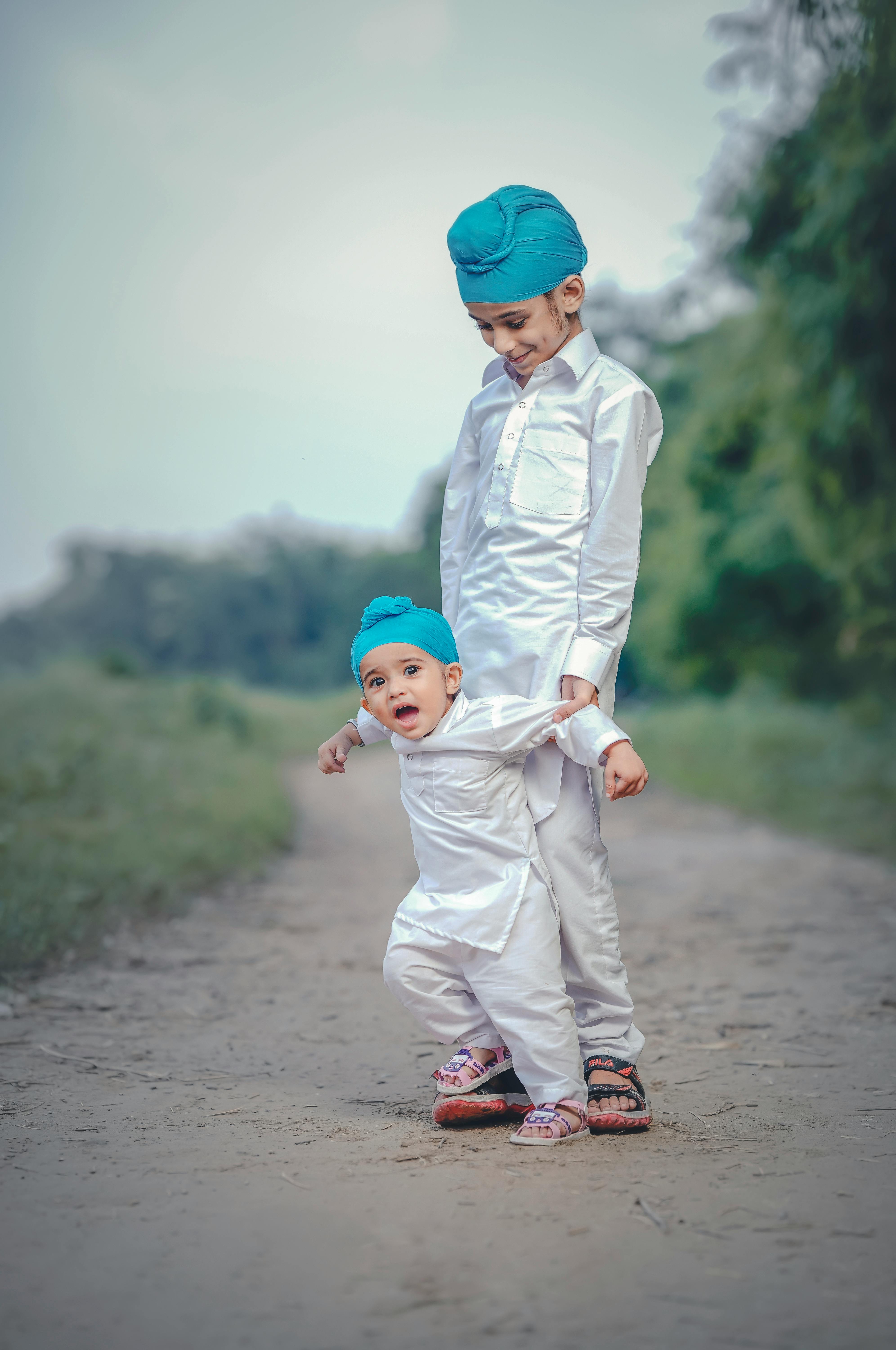 Two Boys Standing on Pathway · Free Stock Photo