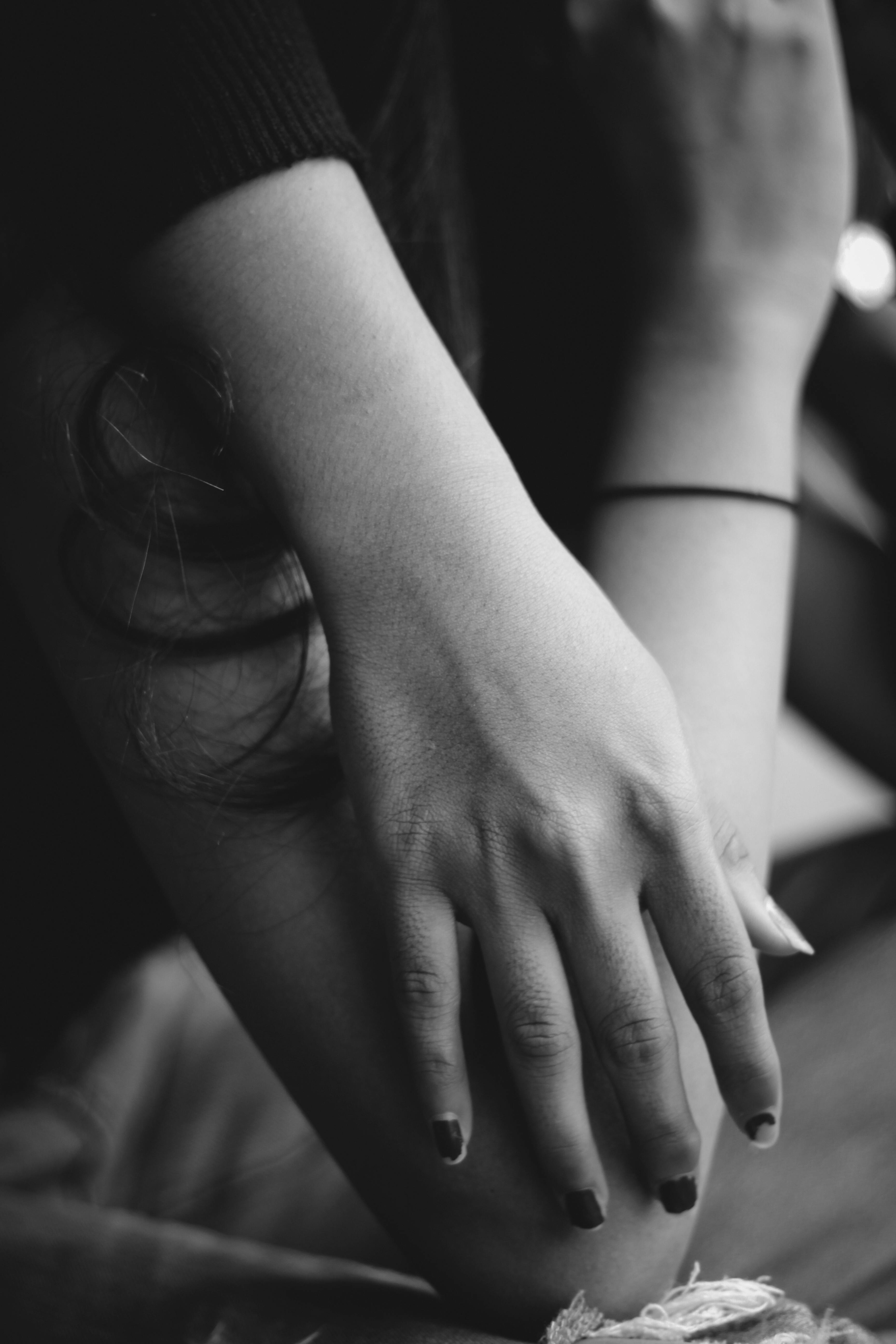 Grayscale Photo of a Person's Hands · Free Stock Photo