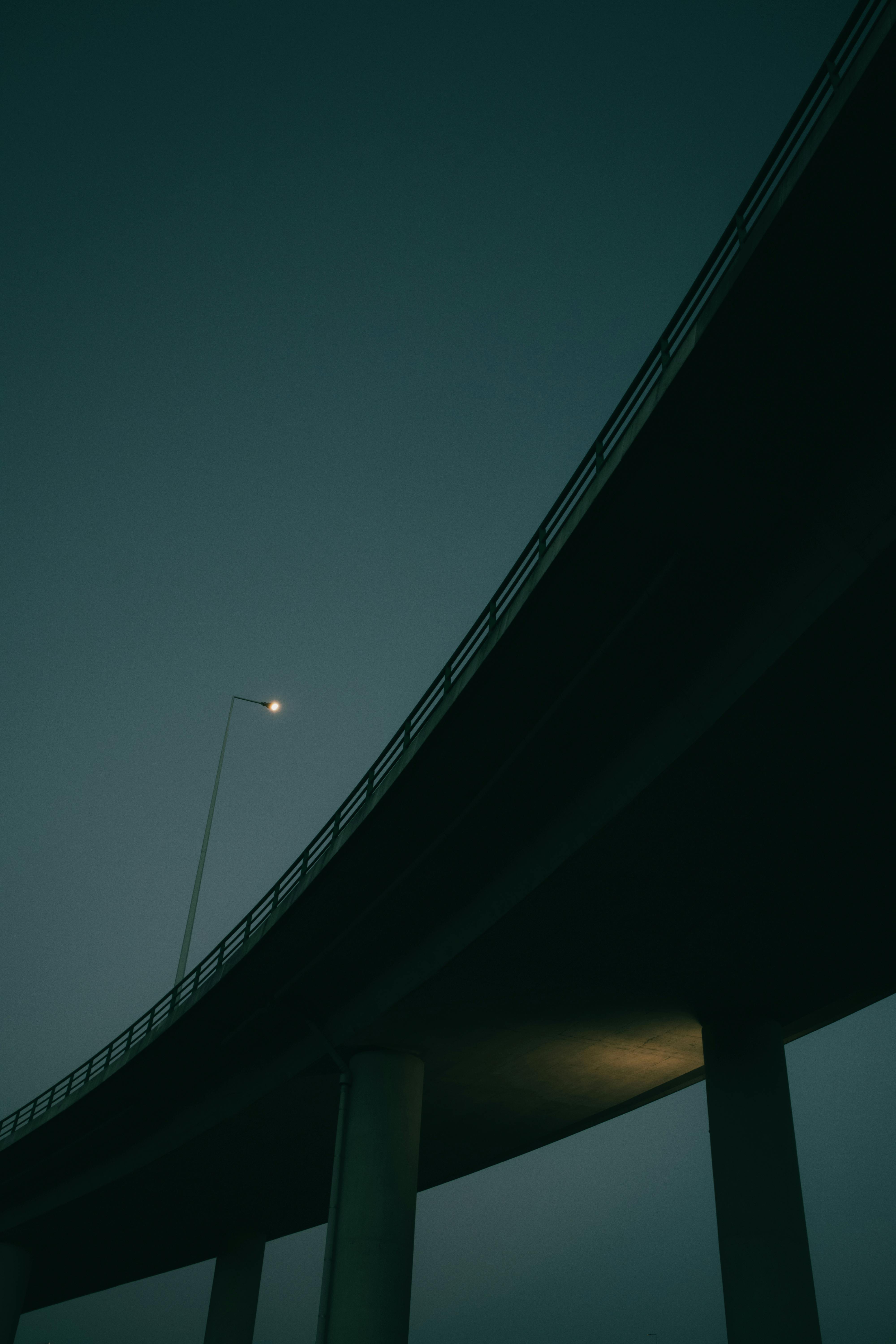 Photo of a Street Lamp on a Bridge · Free Stock Photo