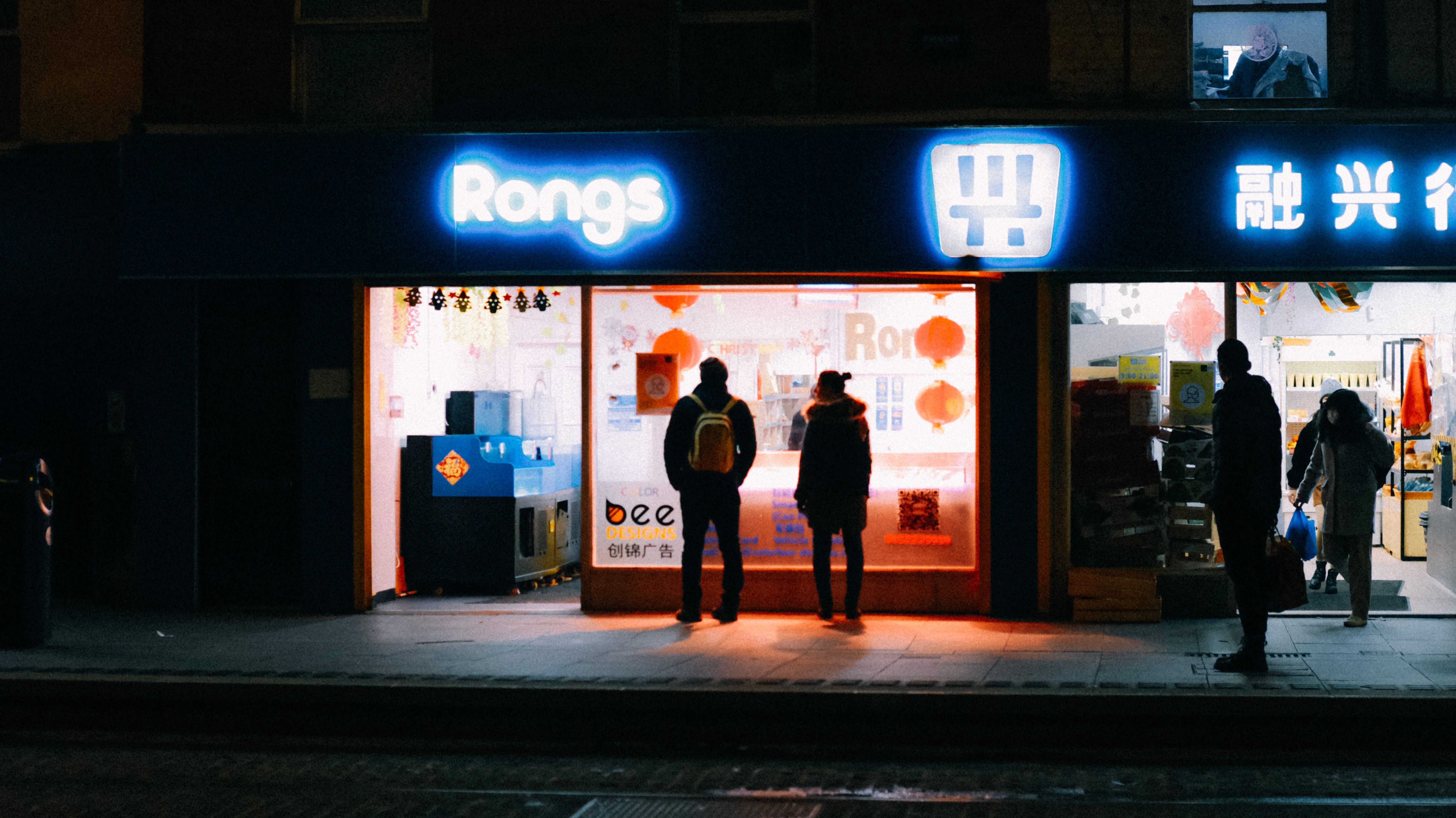 Photo of an Illuminated Kiosk at Night · Free Stock Photo