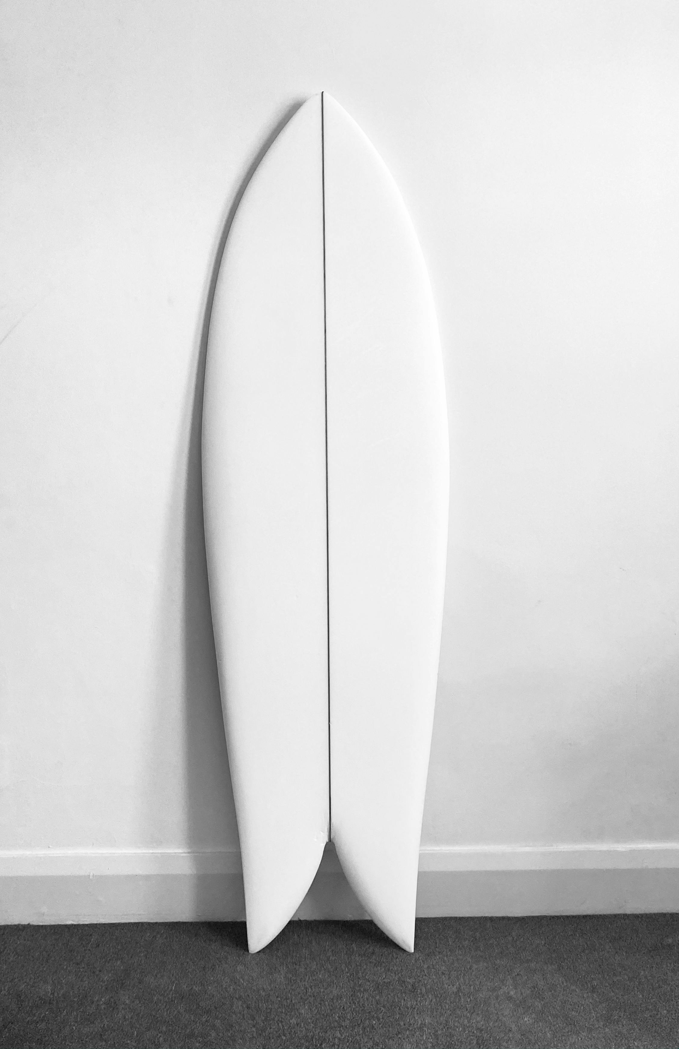 A White Surf Board on White Wall · Free Stock Photo